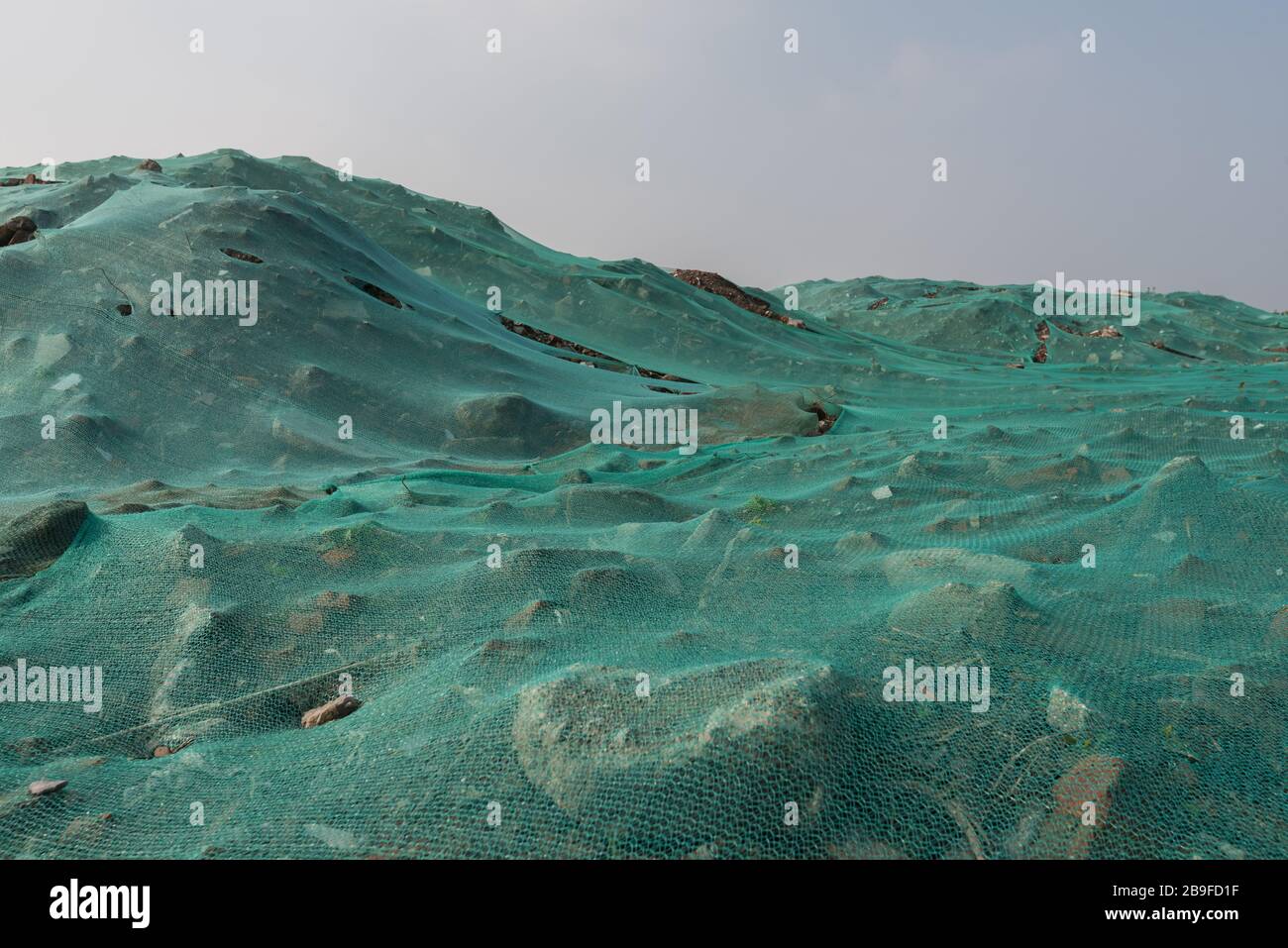 green dustproof mesh in a construction site Stock Photo - Alamy