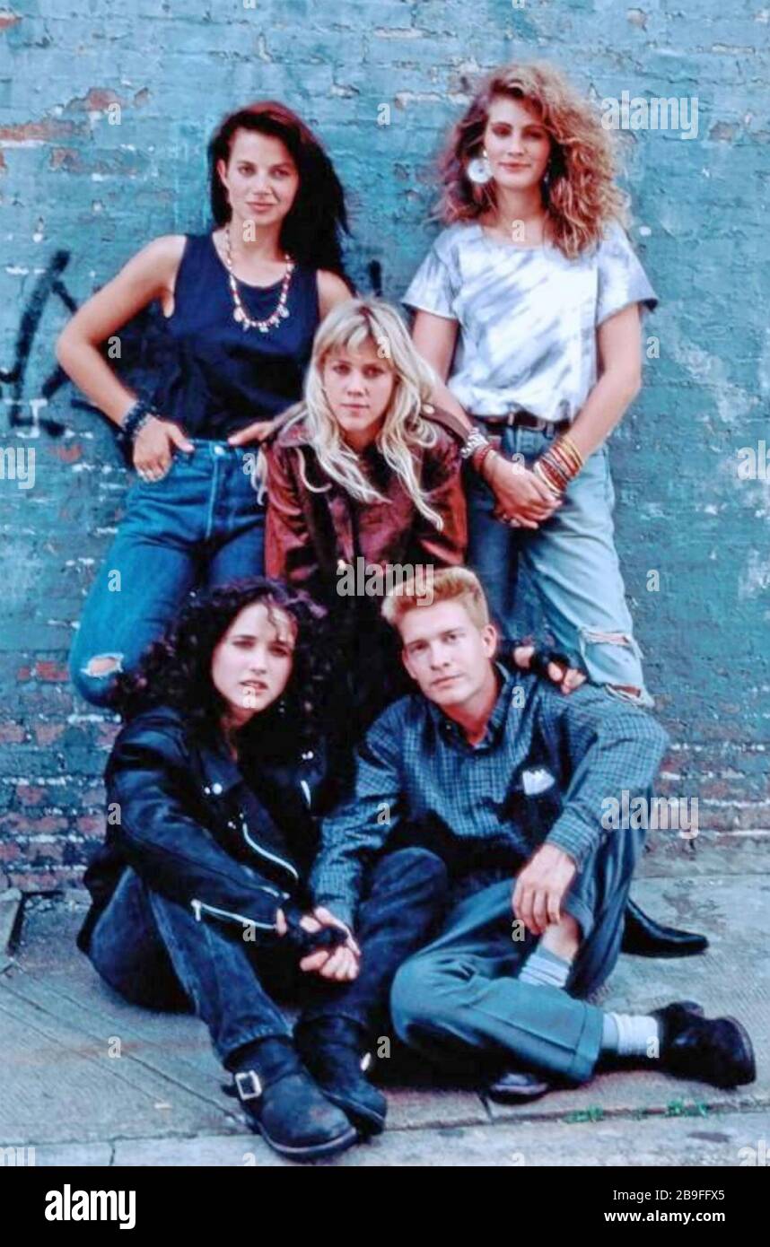 SATISFACTION 1988 20th Century Fox film with Julia Roberts standing at ...