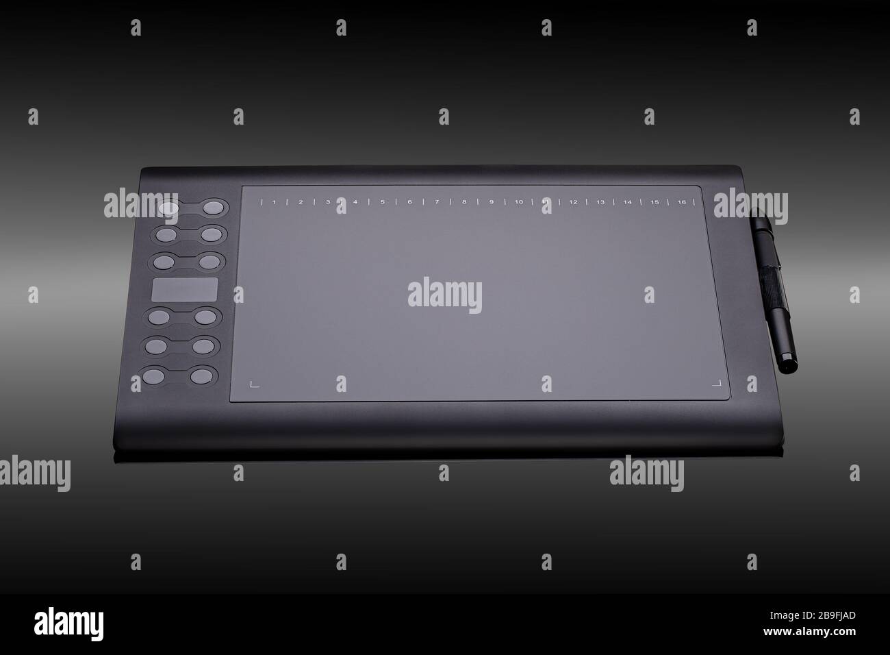 Digital graphic tablet with pen for illustrators and designers on a ...