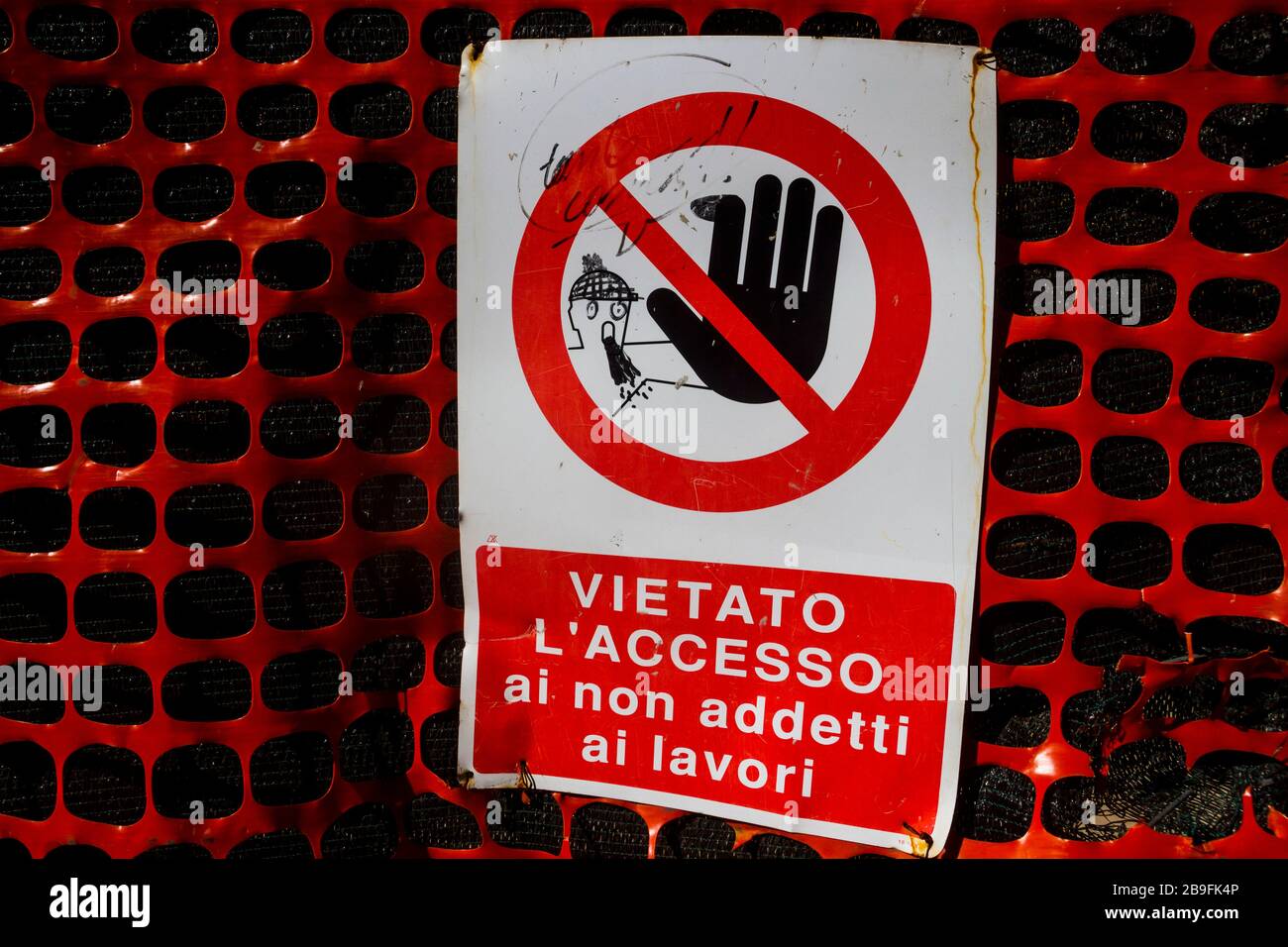 A graffitied No Entry sign on a construction site in Verona, Italy ...