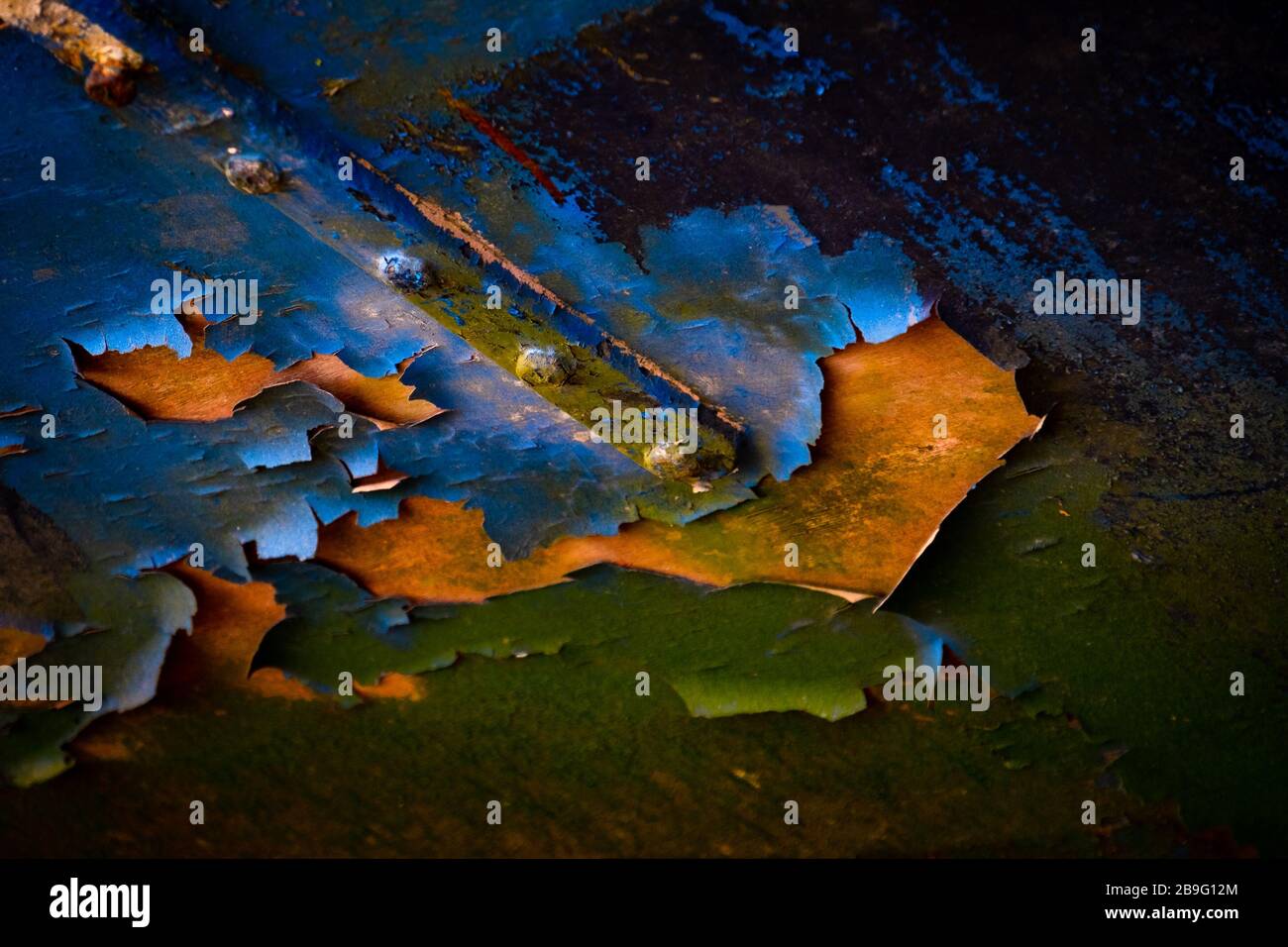 "Colourful neglect" Close up of a hull side with colour paint simply ...