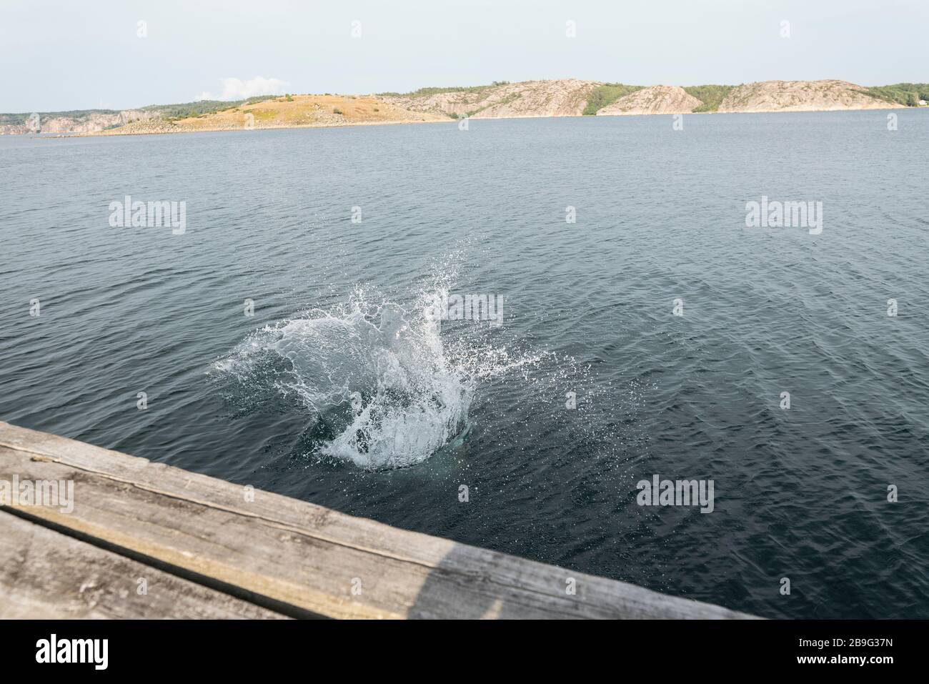 Splashing lake water Stock Photo - Alamy