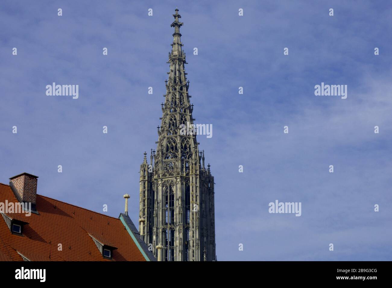 Steeple of Minster of ulm with the view of the historic house roof with ...