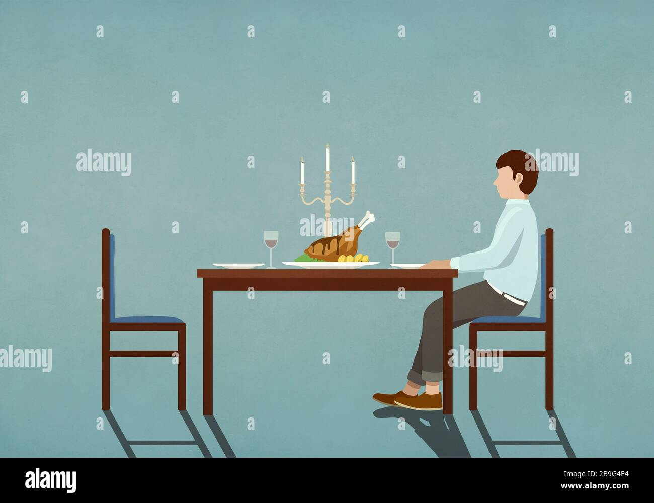 Man waiting at table with candlelight dinner Stock Photo - Alamy