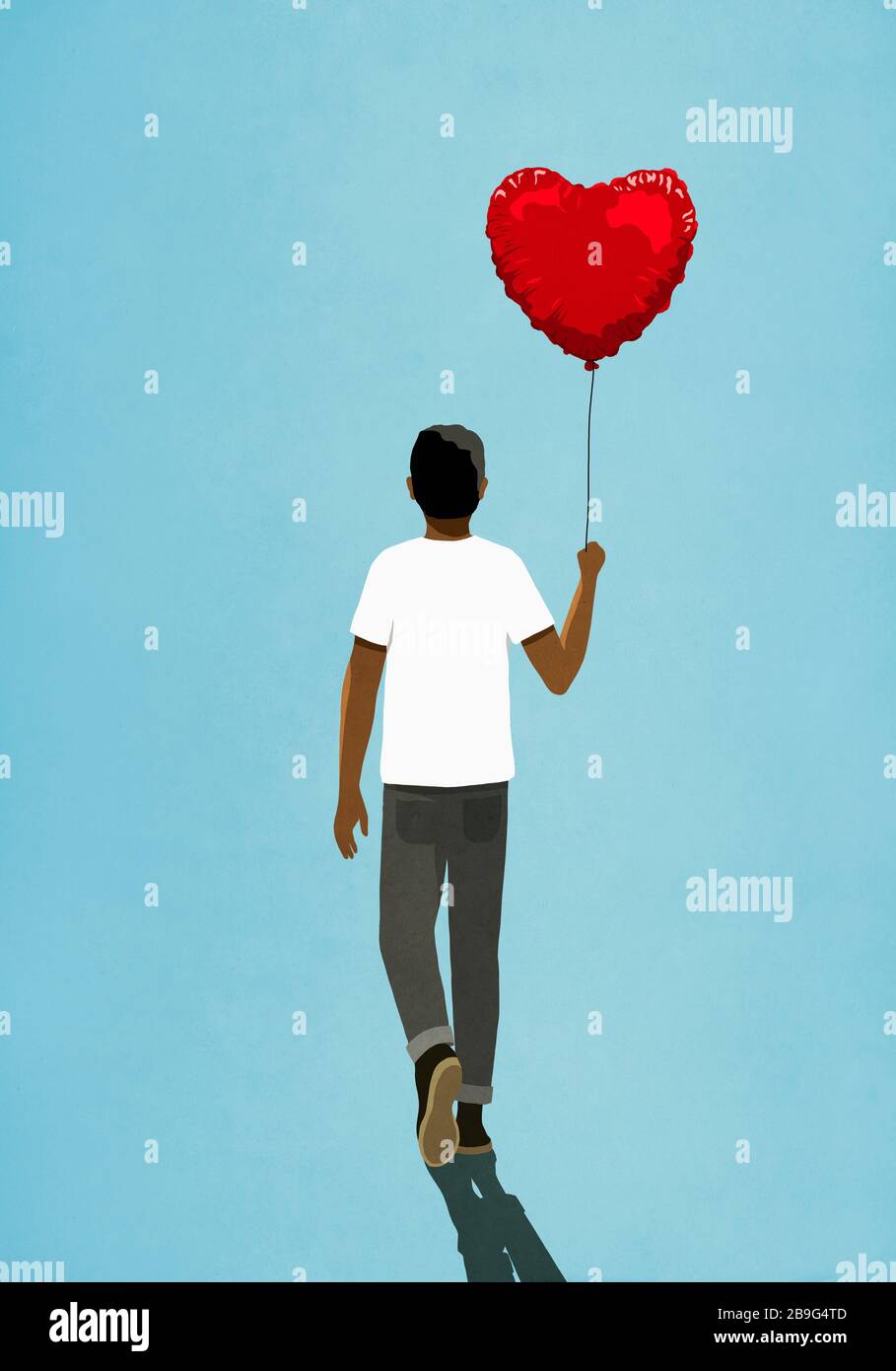 Man walking with heart shape balloon Stock Photo - Alamy