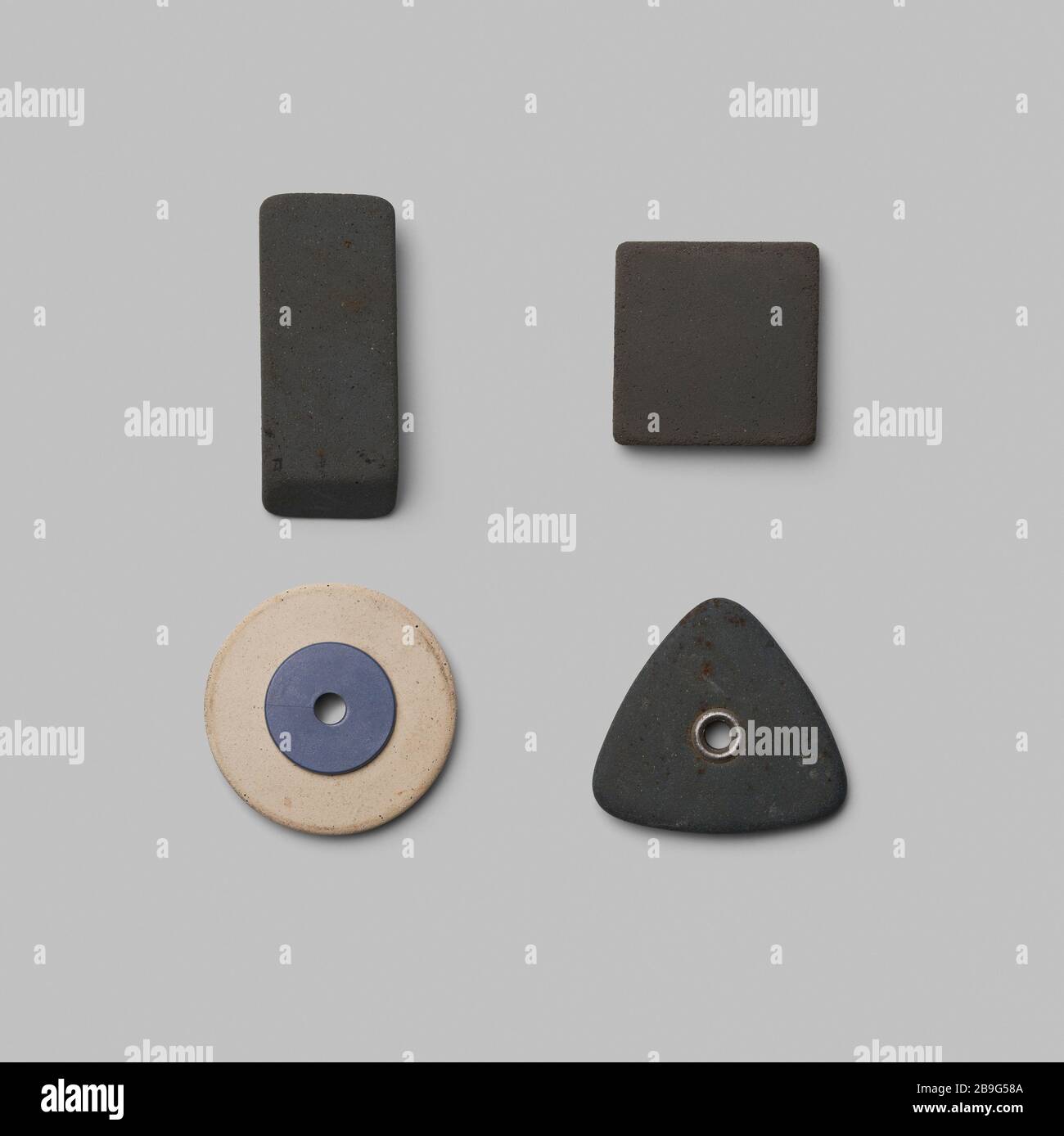 Rubber pieces in various shapes on gray background Stock Photo - Alamy