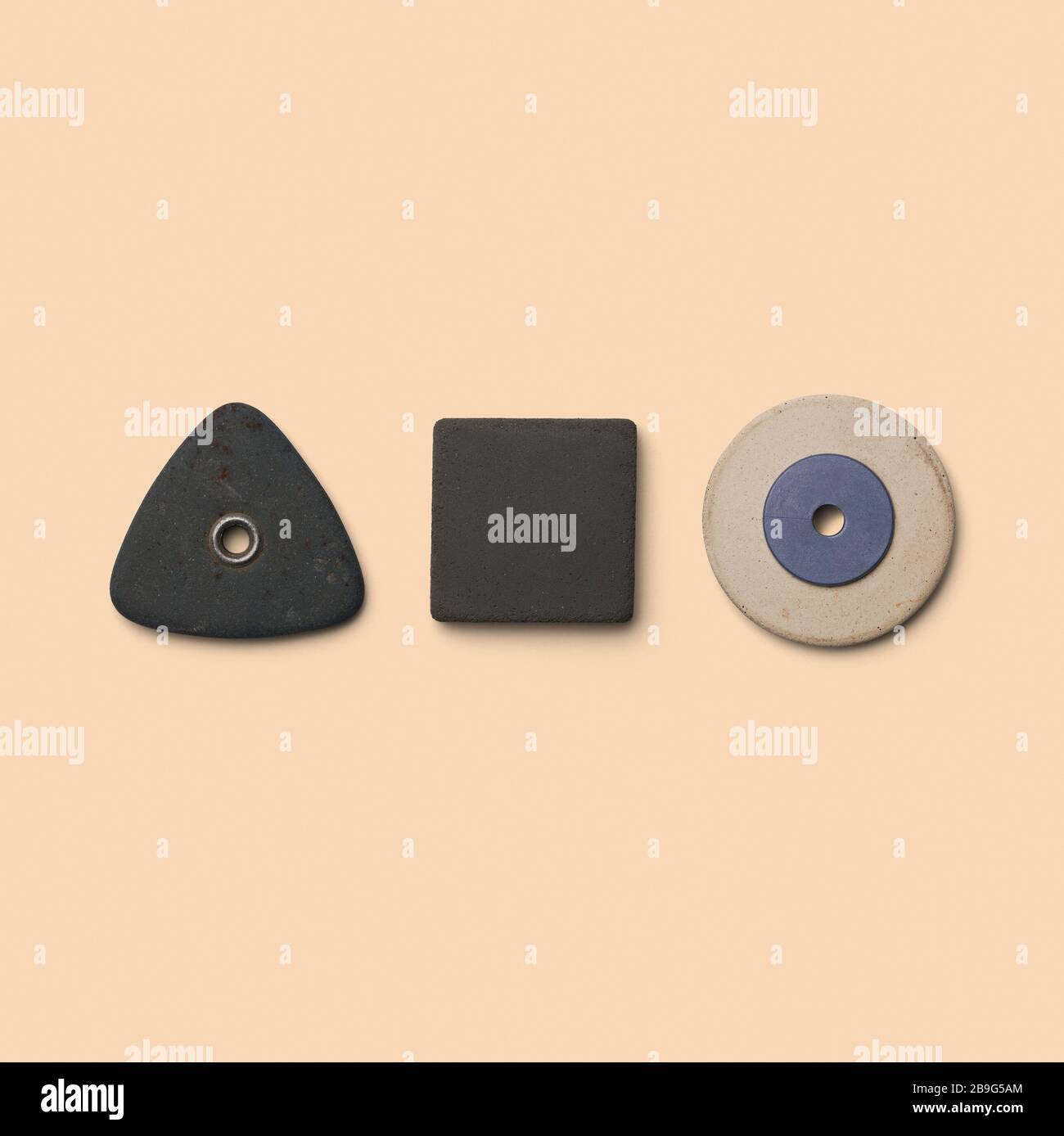 Rubber pieces in various shapes on yellow background Stock Photo - Alamy