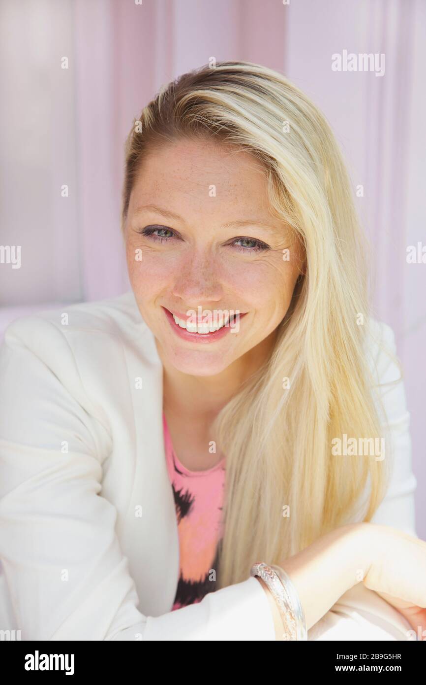 Portrait confident young blonde woman Stock Photo - Alamy Portrait confident young blonde woman Stock Photo - Alamy