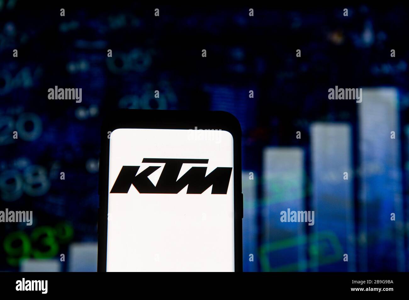 In this photo illustration a KTM logo seen displayed on a smartphone ...