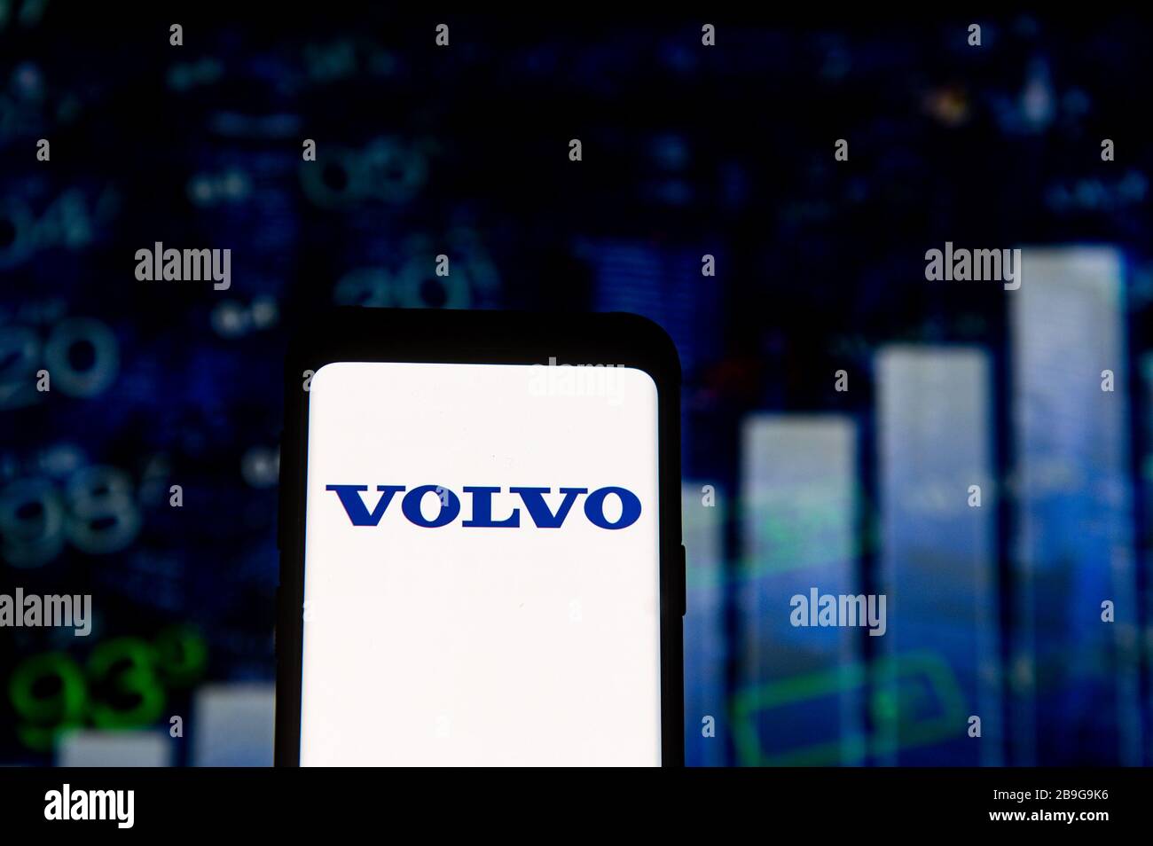 In this photo illustration a Volvo logo seen displayed on a smartphone ...