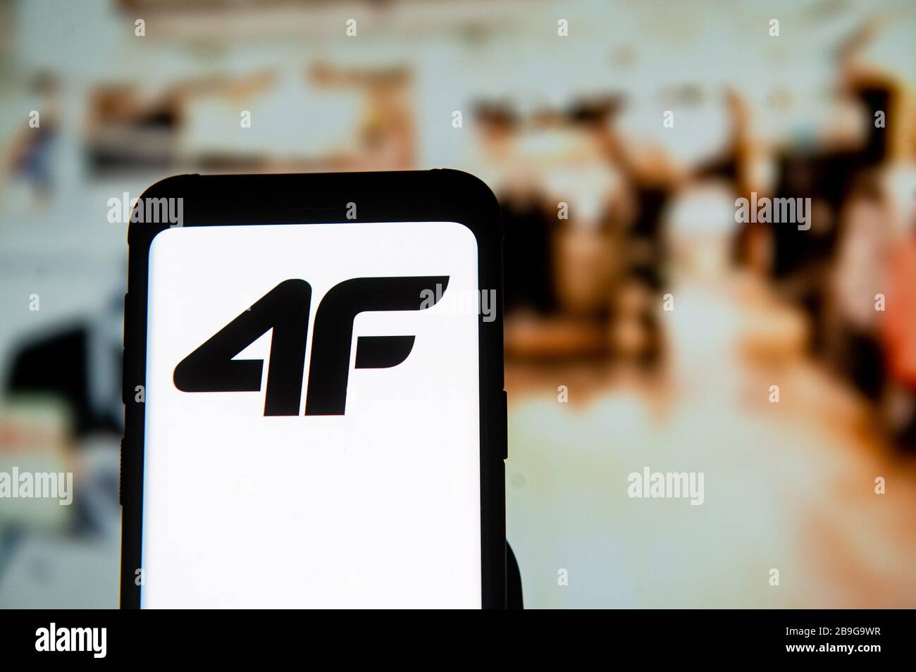 In this photo illustration a 4F logo seen displayed on a smartphone ...