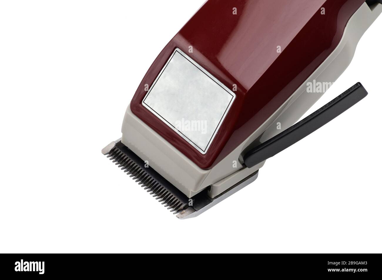 Hair clipper on head on an isolated white background Stock Photo - Alamy