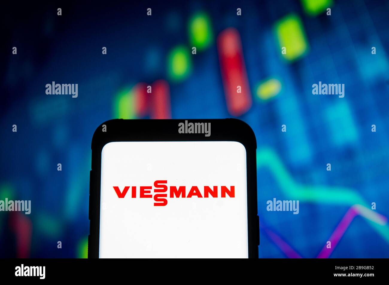 In this photo illustration a Viessman logo seen displayed on a ...