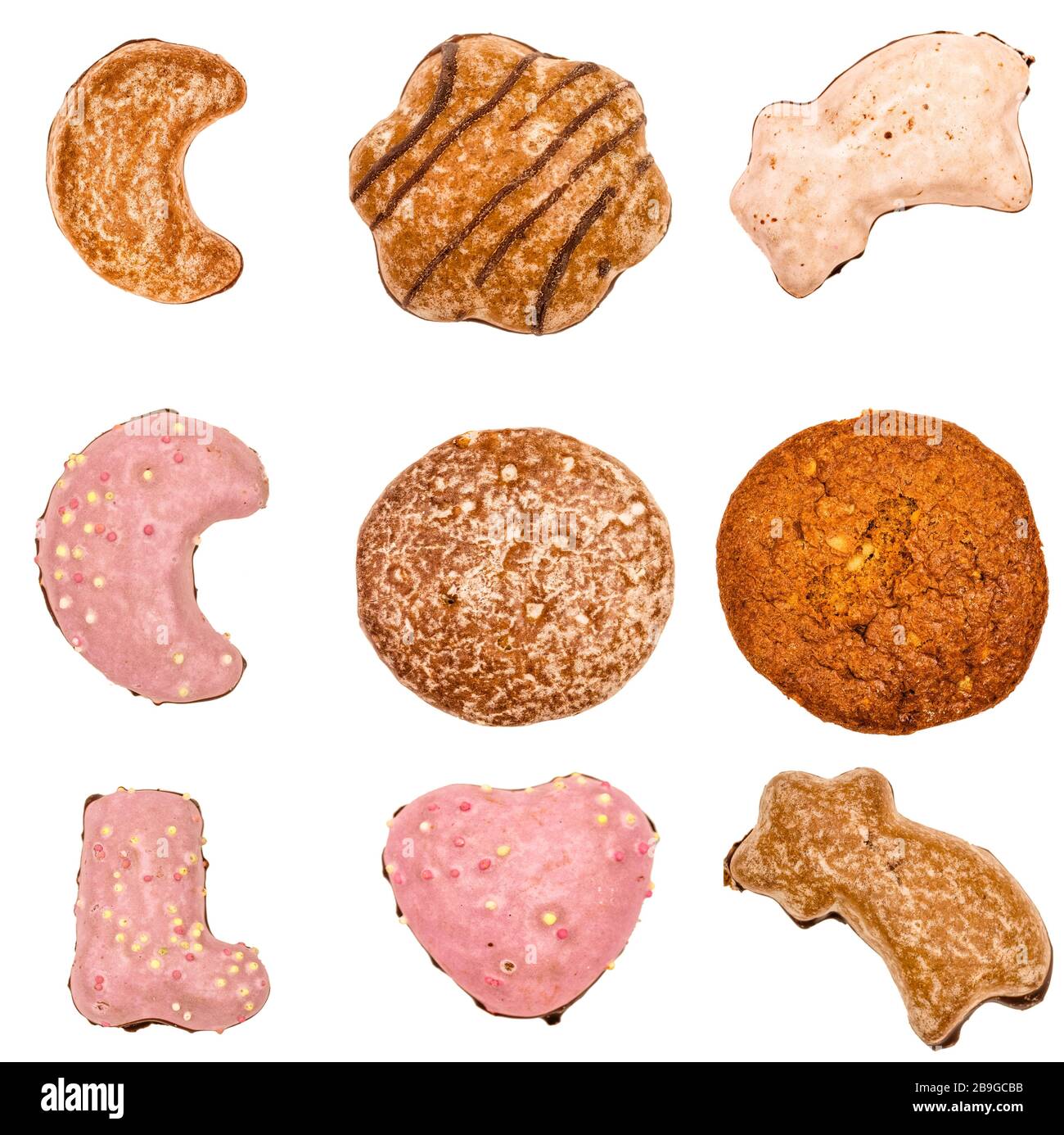 Different gingerbread cookies white isolated Stock Photo - Alamy