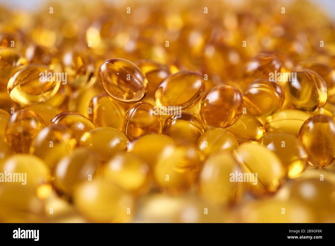 Soft yellow gelatin vitamin D capsules (frog eye view close up Stock ...