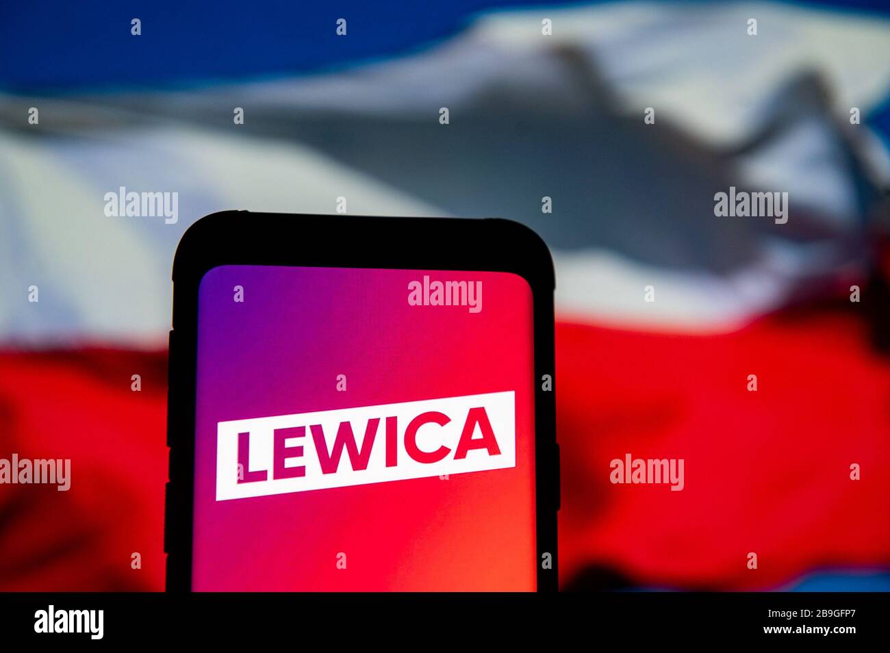 Poland. 23rd Mar, 2020. In this photo illustration a Lewica logo seen ...