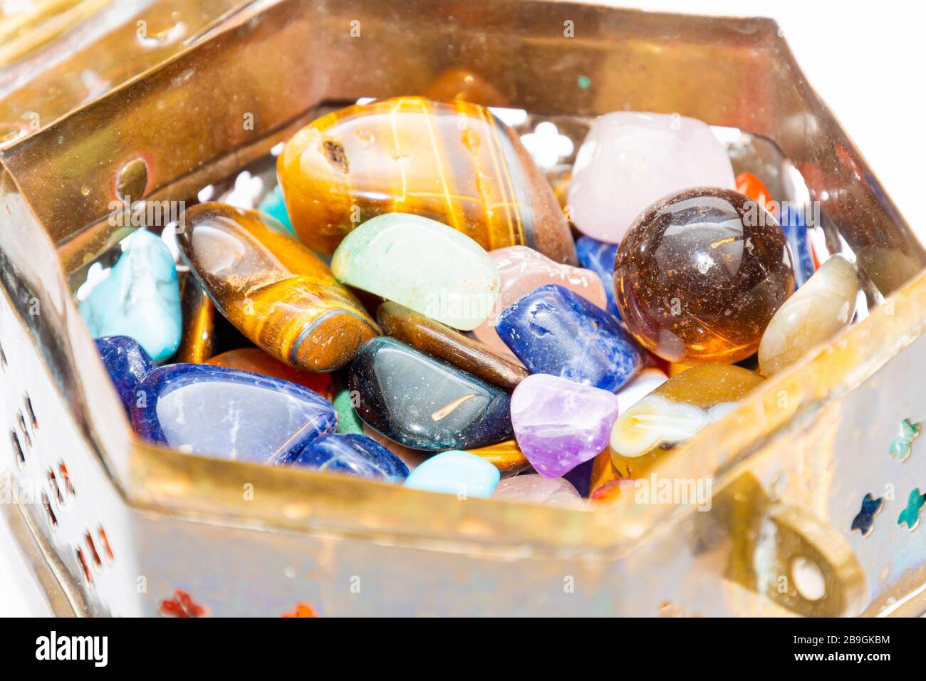 Collection of colorful gemstones in old jewelery box Stock Photo - Alamy