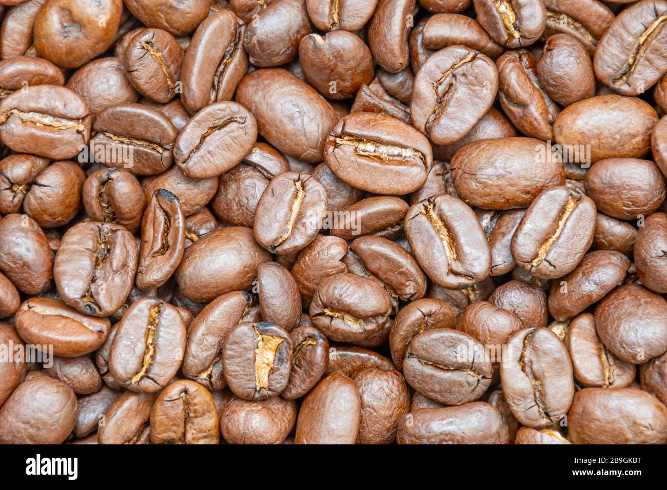 Coffee beans background texture of roasted seed close up Stock Photo ...