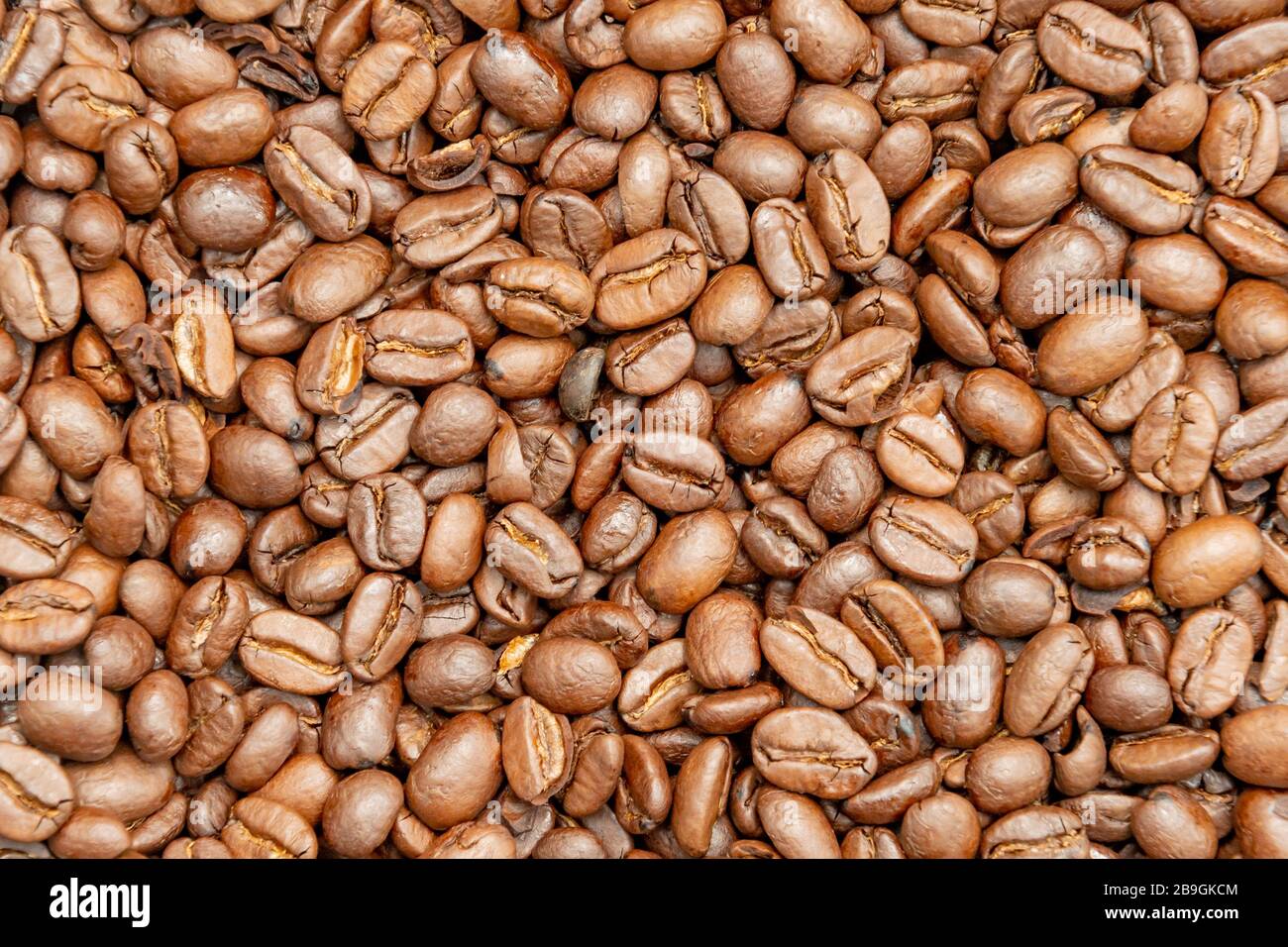 Coffee beans roasted dark brown seed texture or background Stock Photo ...