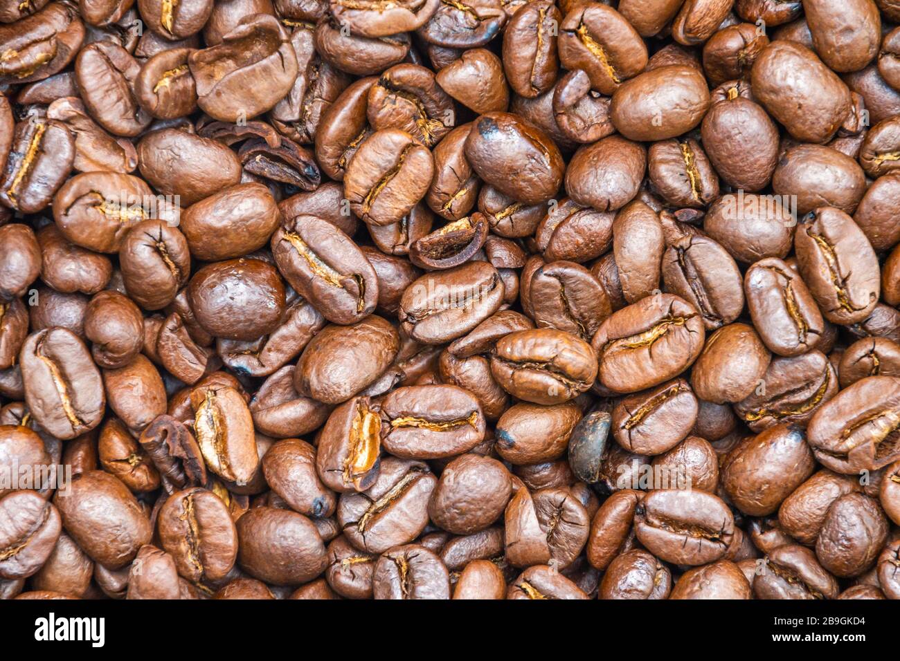 Coffee beans roasted dark brown seed close up background texture Stock ...