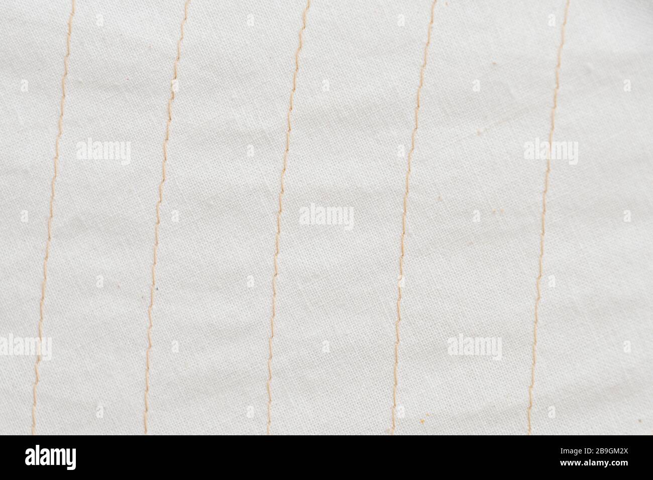 Sailcloth in white texture of woven fabric with beige stitching stripes ...