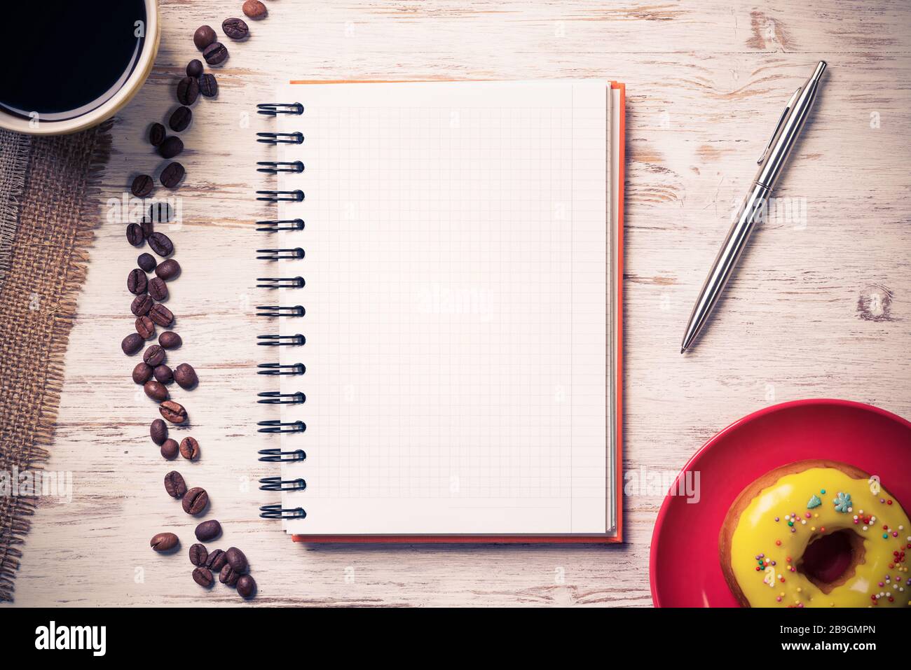 Coffee break with snack Stock Photo - Alamy