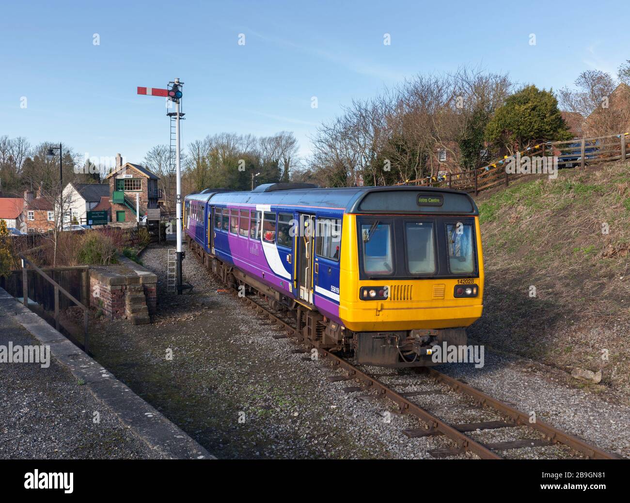 Former Northern rail class 142 pacer trains 142028 + 142060 passing Preston Under Scar ...