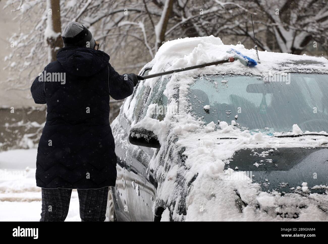 Remove snow from a heavy snowfall hi-res stock photography and images ...