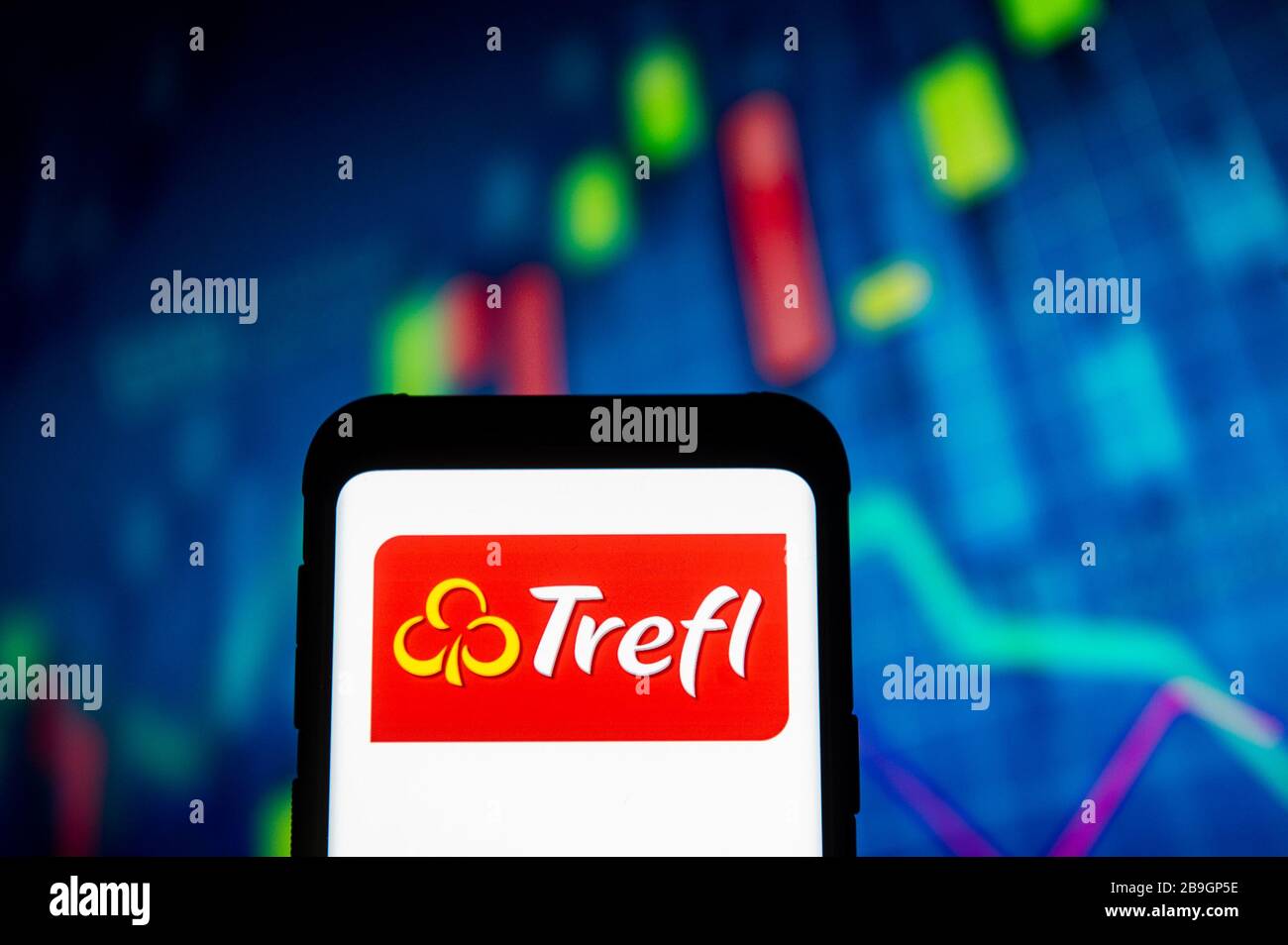 Poland. 23rd Mar, 2020. In this photo illustration a Trefl logo seen displayed on a smartphone.A ...