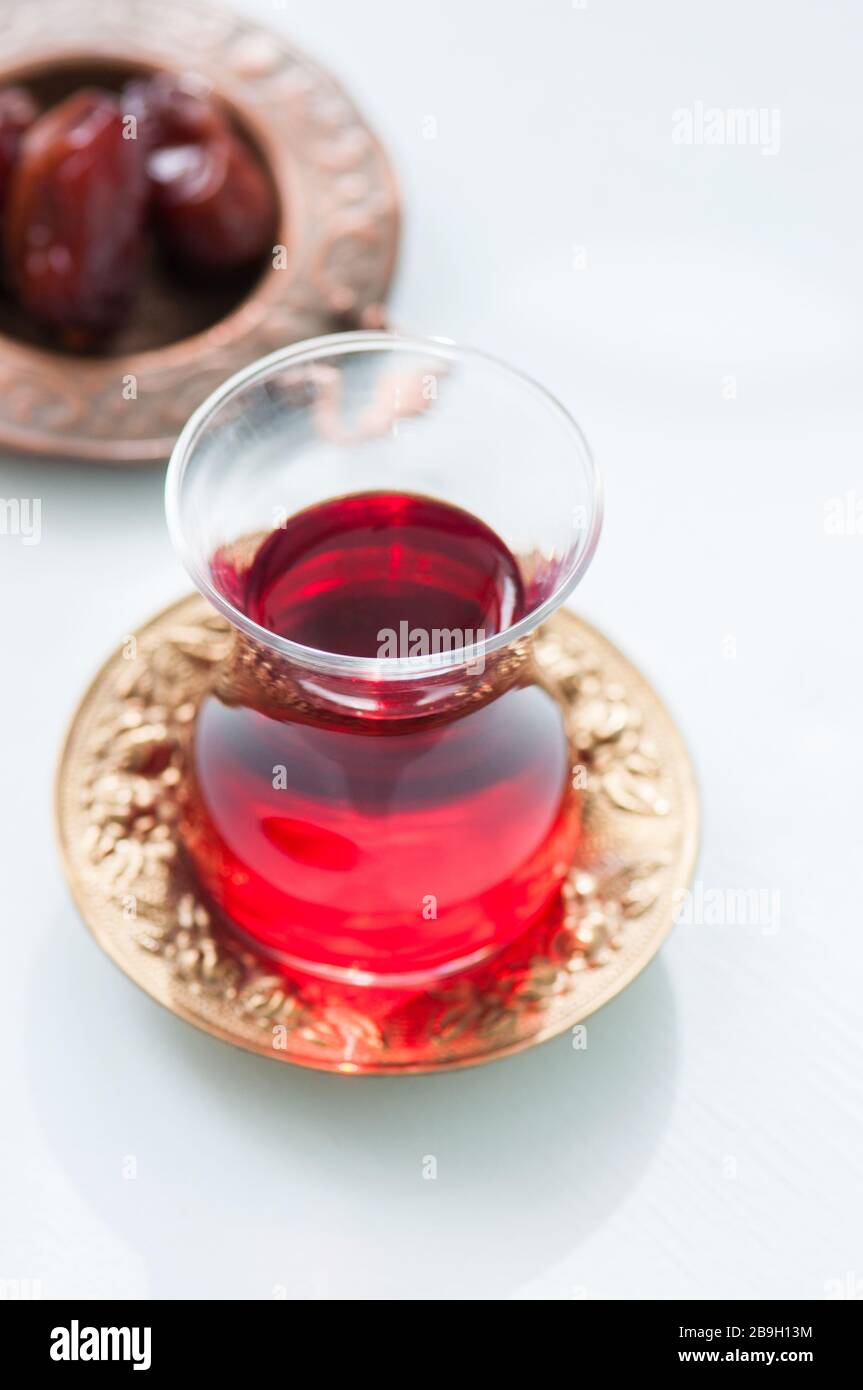 Glass of red turkish tea. Close up. Eastern culture concept Stock Photo ...