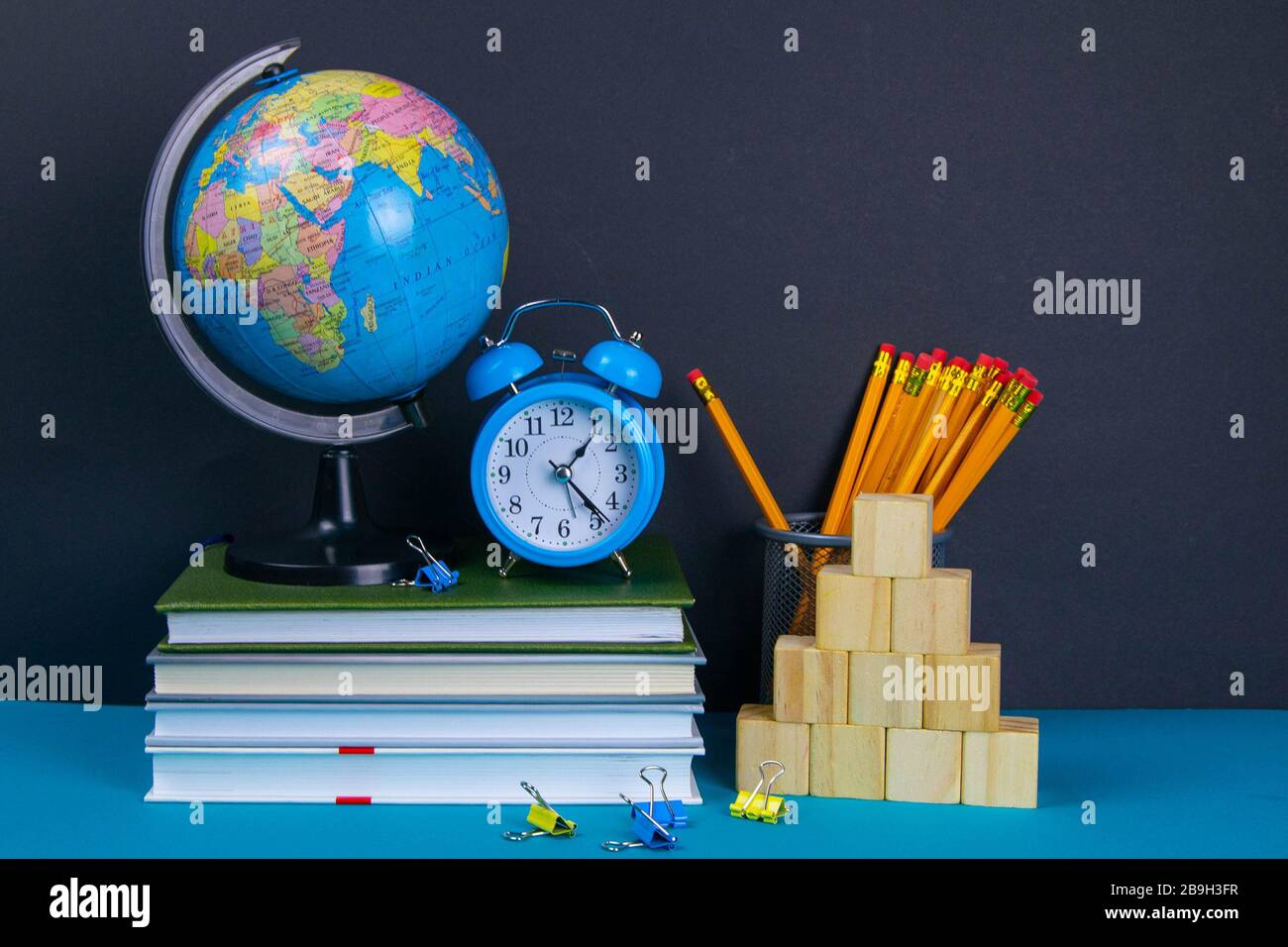 Globe Clock On Books High Resolution Stock Photography and Images - Alamy