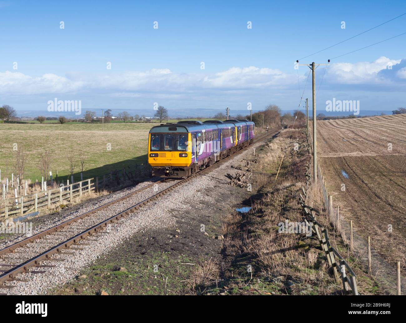 Former Northern rail class 142pacer trains 142060 + 142028 passing Hill ...