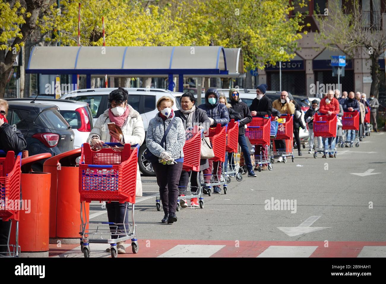 Coronavirus pandemic effects: long queue to enter the supermarket for ...