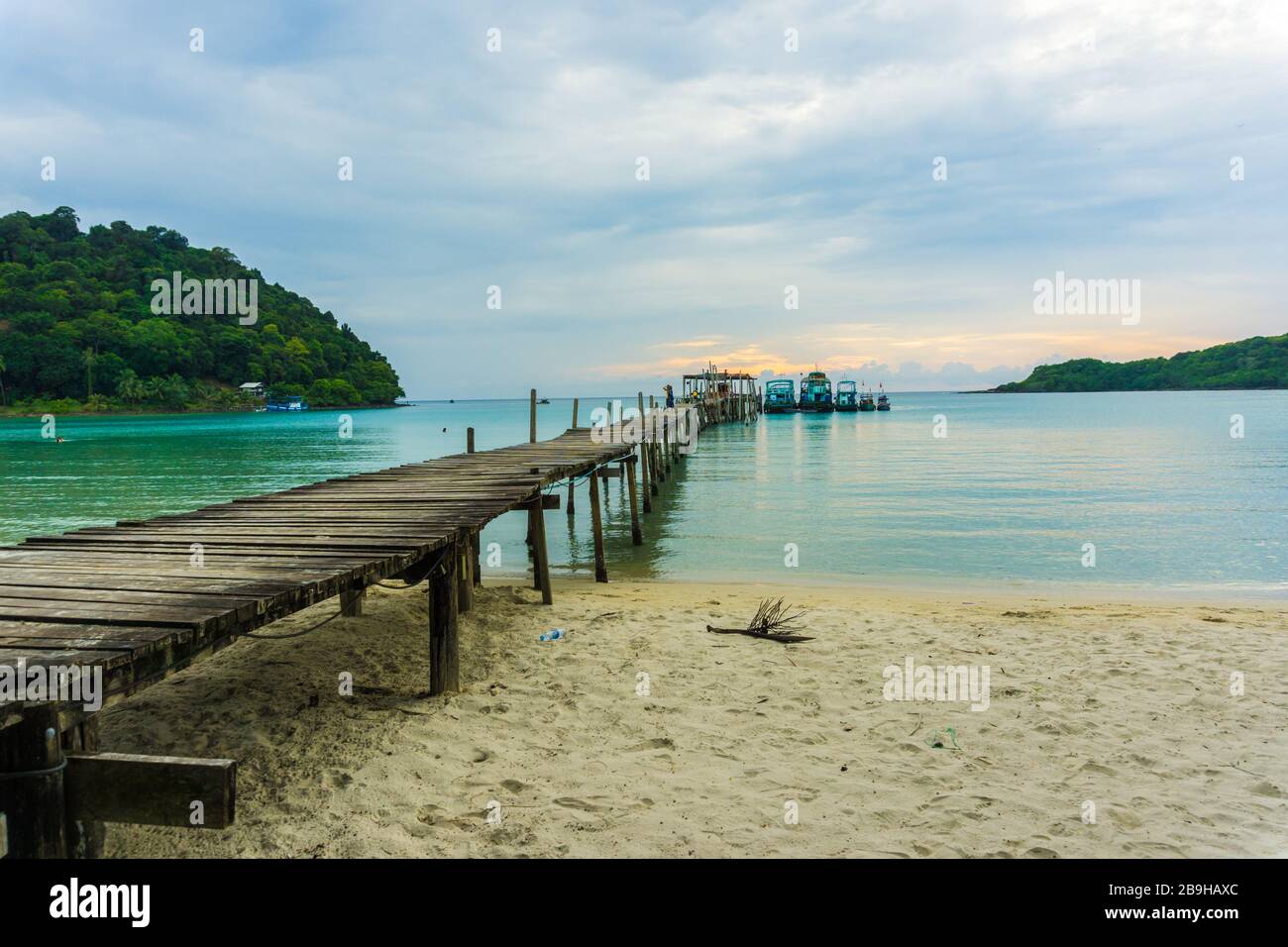 Wooden sea bridge to bay sunset sky with cloud nature landscape Stock ...