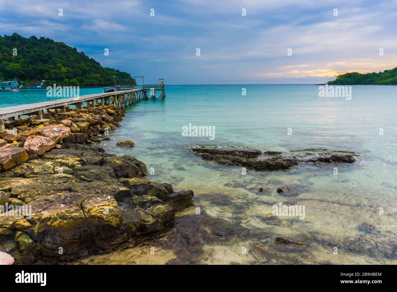 Wooden sea bridge to bay sunset sky with cloud nature landscape Stock ...