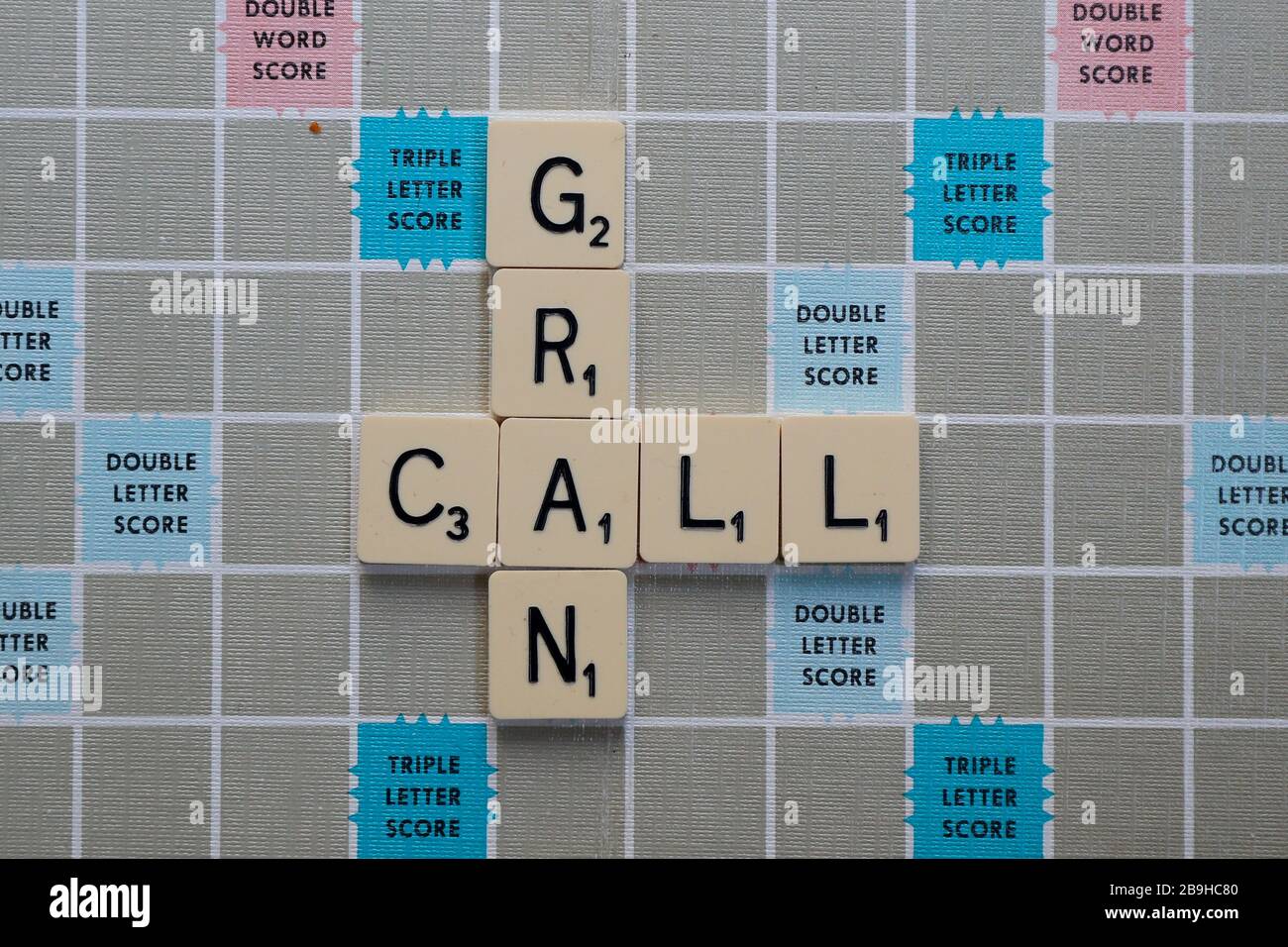 London, UK. 24th March, 2020. Scrabble Board with phrases and words ...