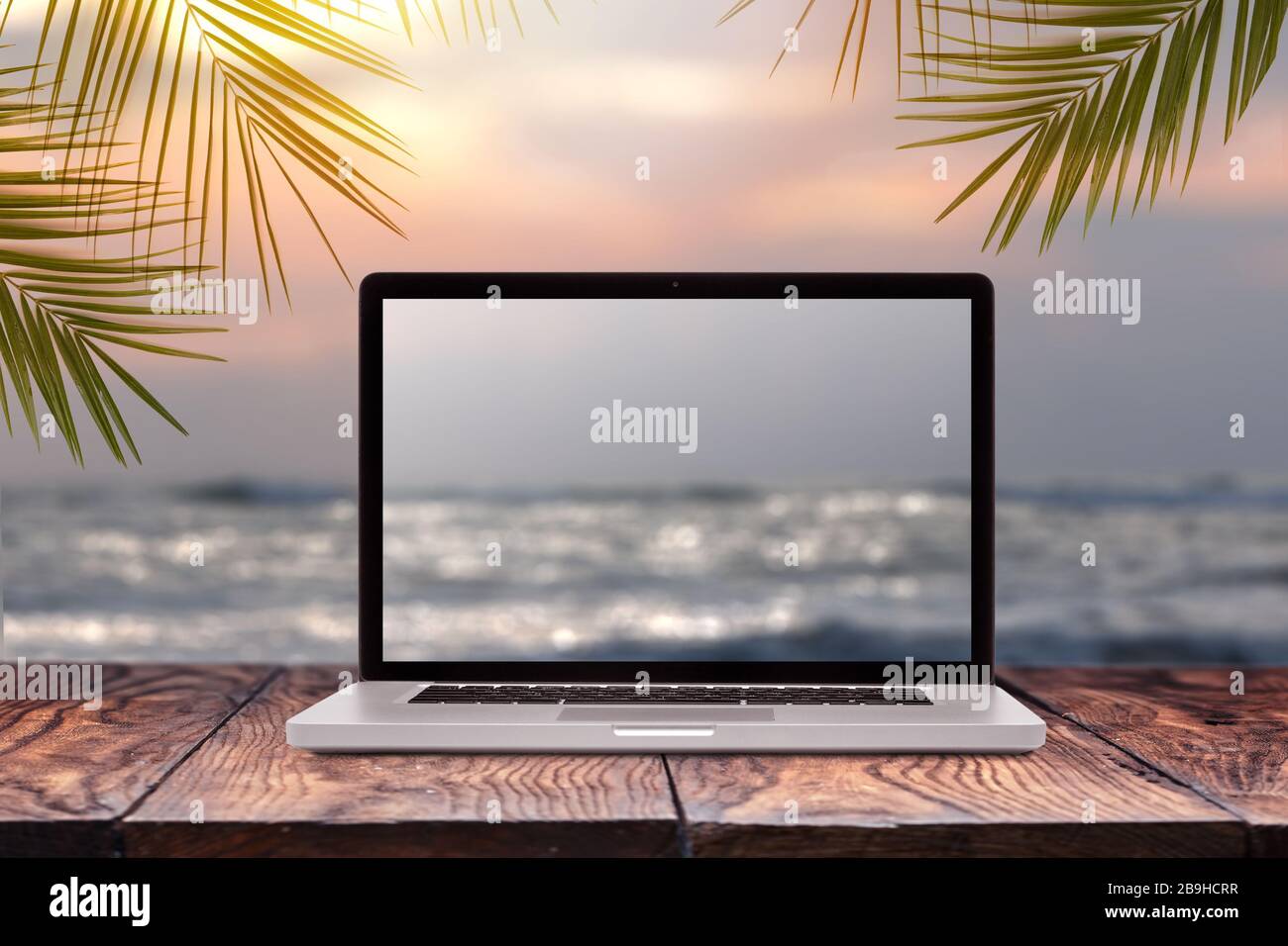 Laptop screen with blurred sea background Stock Photo - Alamy
