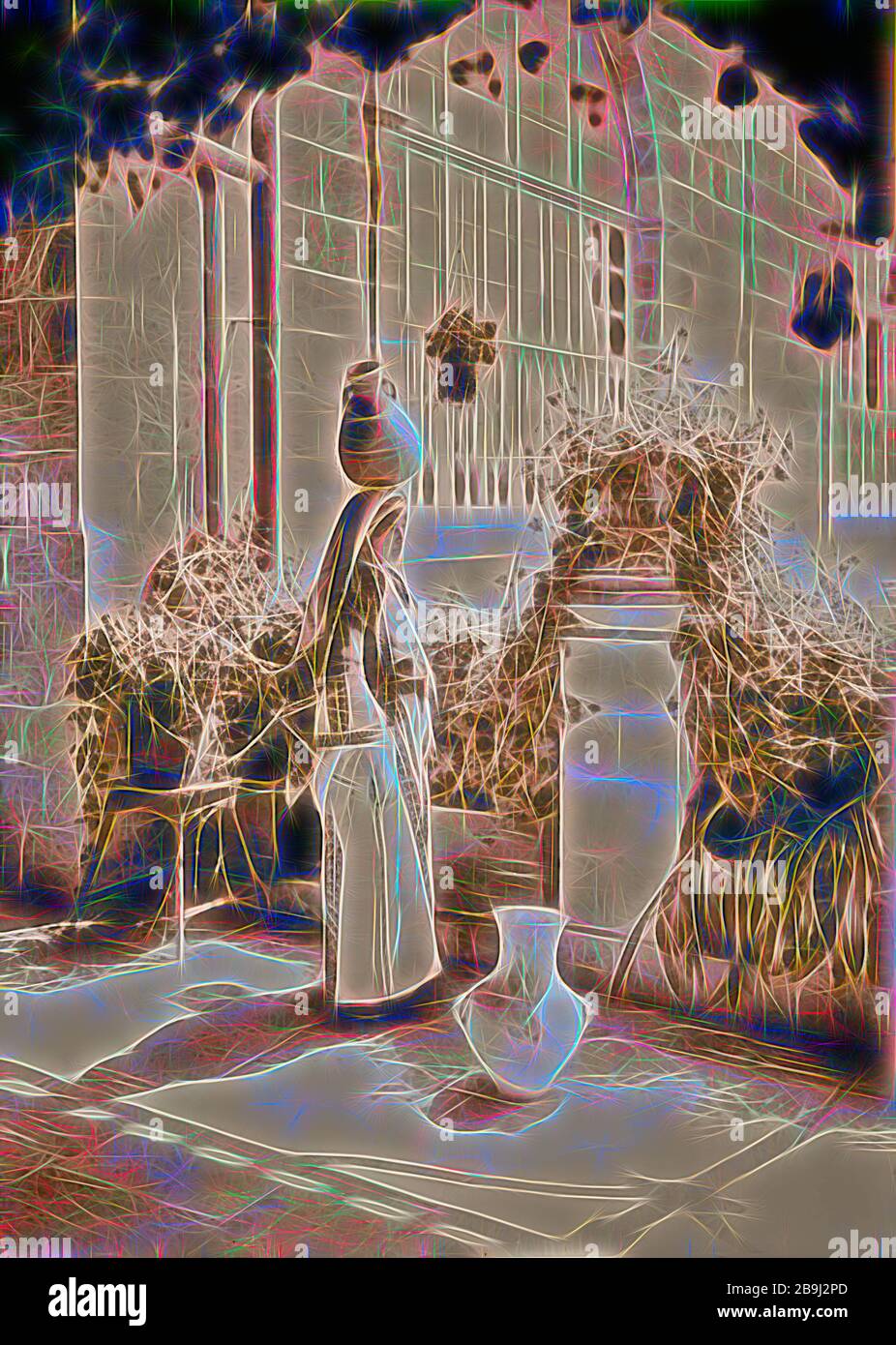 Woman from Ramallah, standing in courtyard of the American Colony, with ...