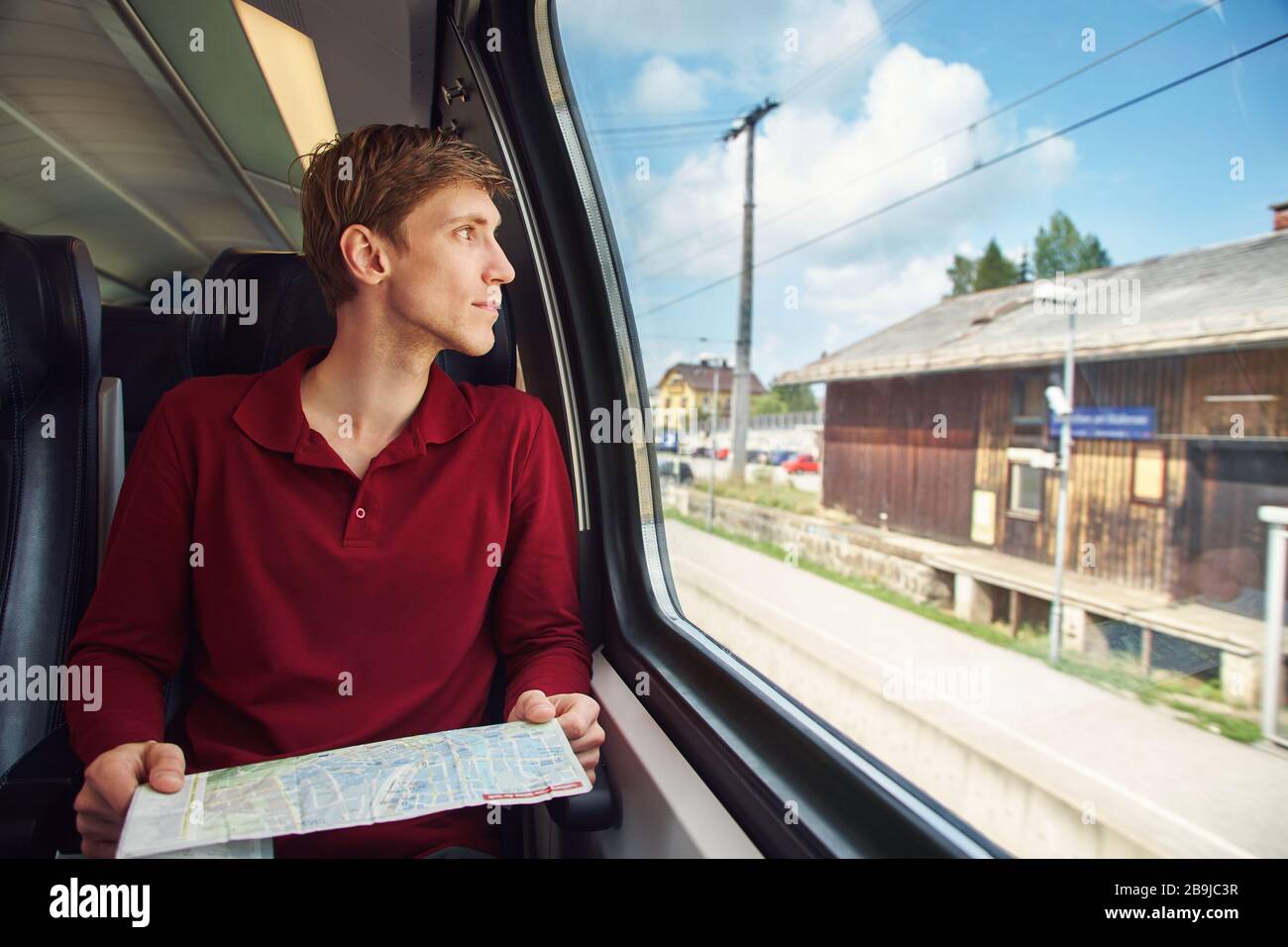 Man travelling on train hi-res stock photography and images - Alamy