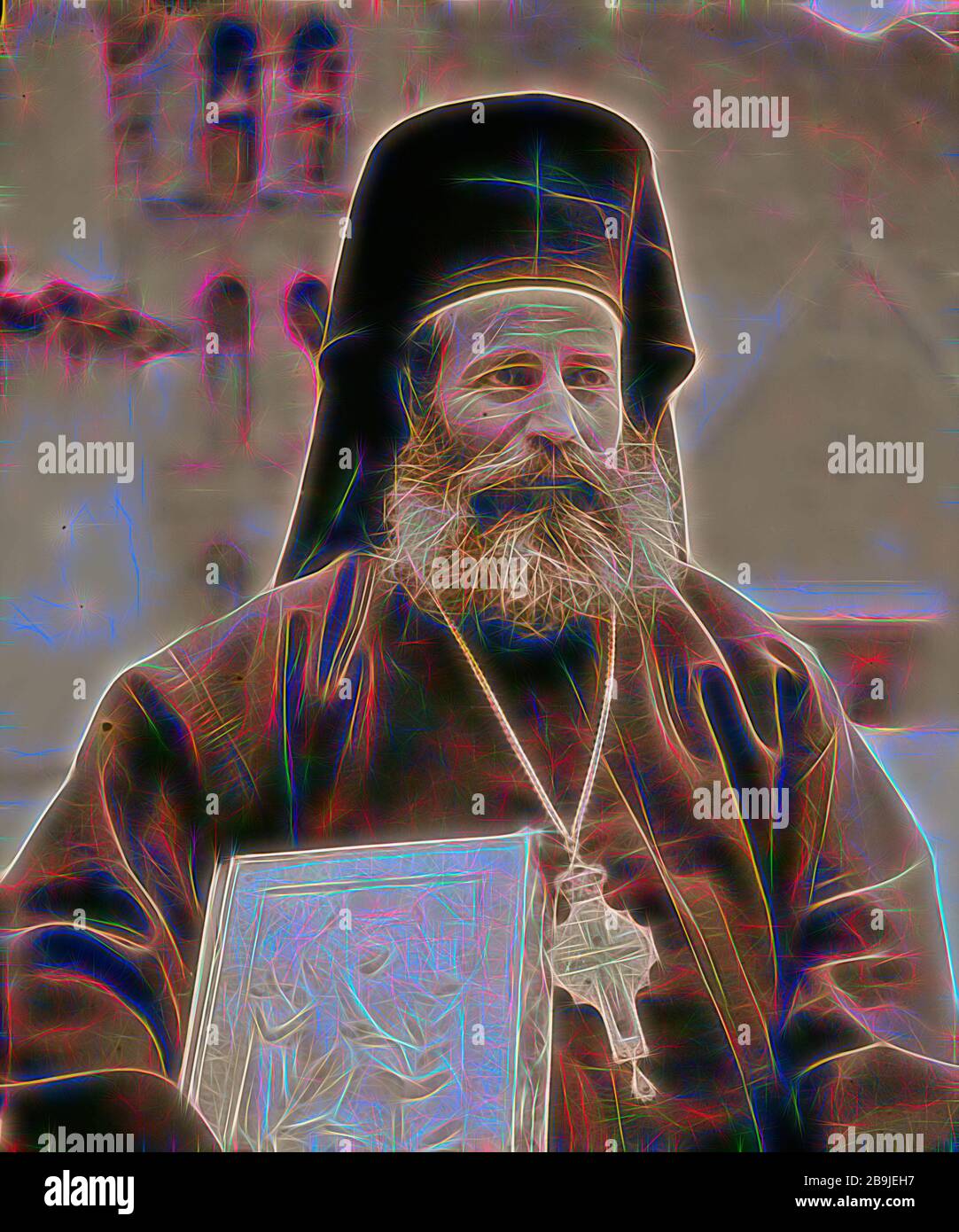 Greek Orthodox priest at St. Catherine's Monastery in the Sinai holding ...