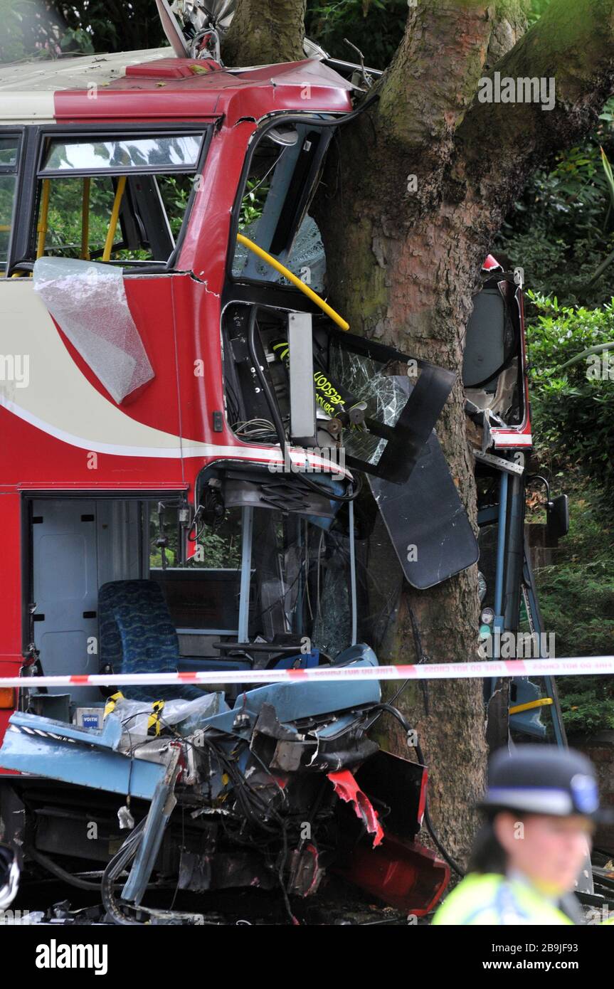 An iconic red double decker London bus crashed into a tree in Croydon ...