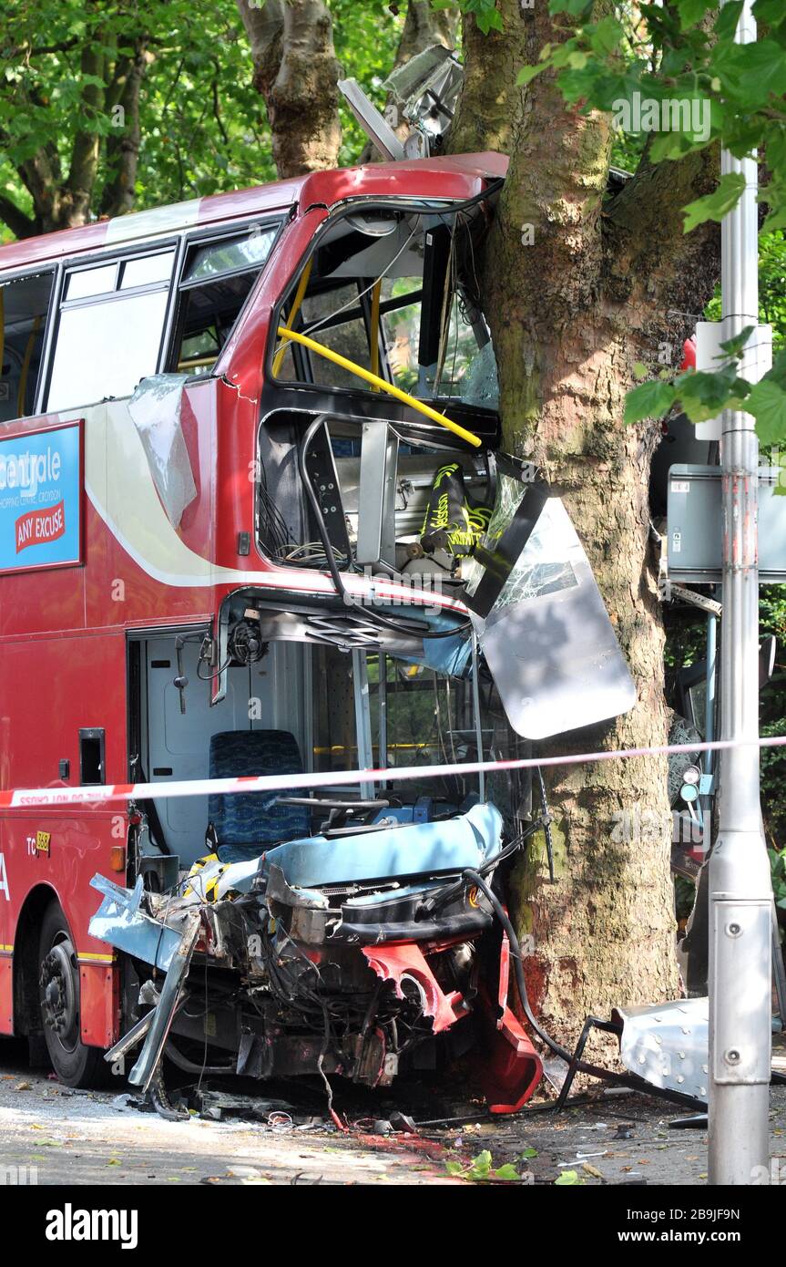 An iconic red double decker London bus crashed into a tree in Croydon ...