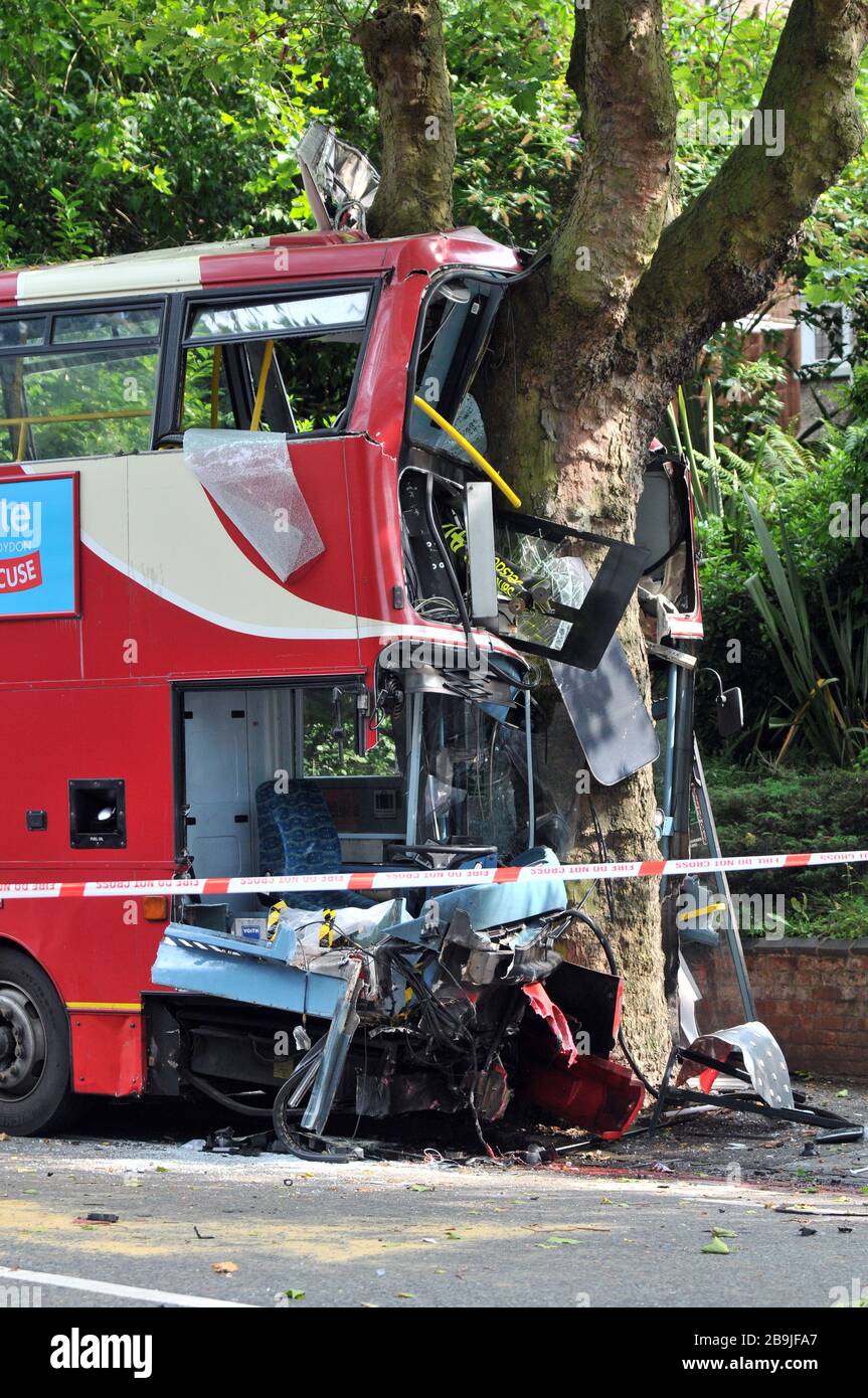An iconic red double decker London bus crashed into a tree in Croydon ...