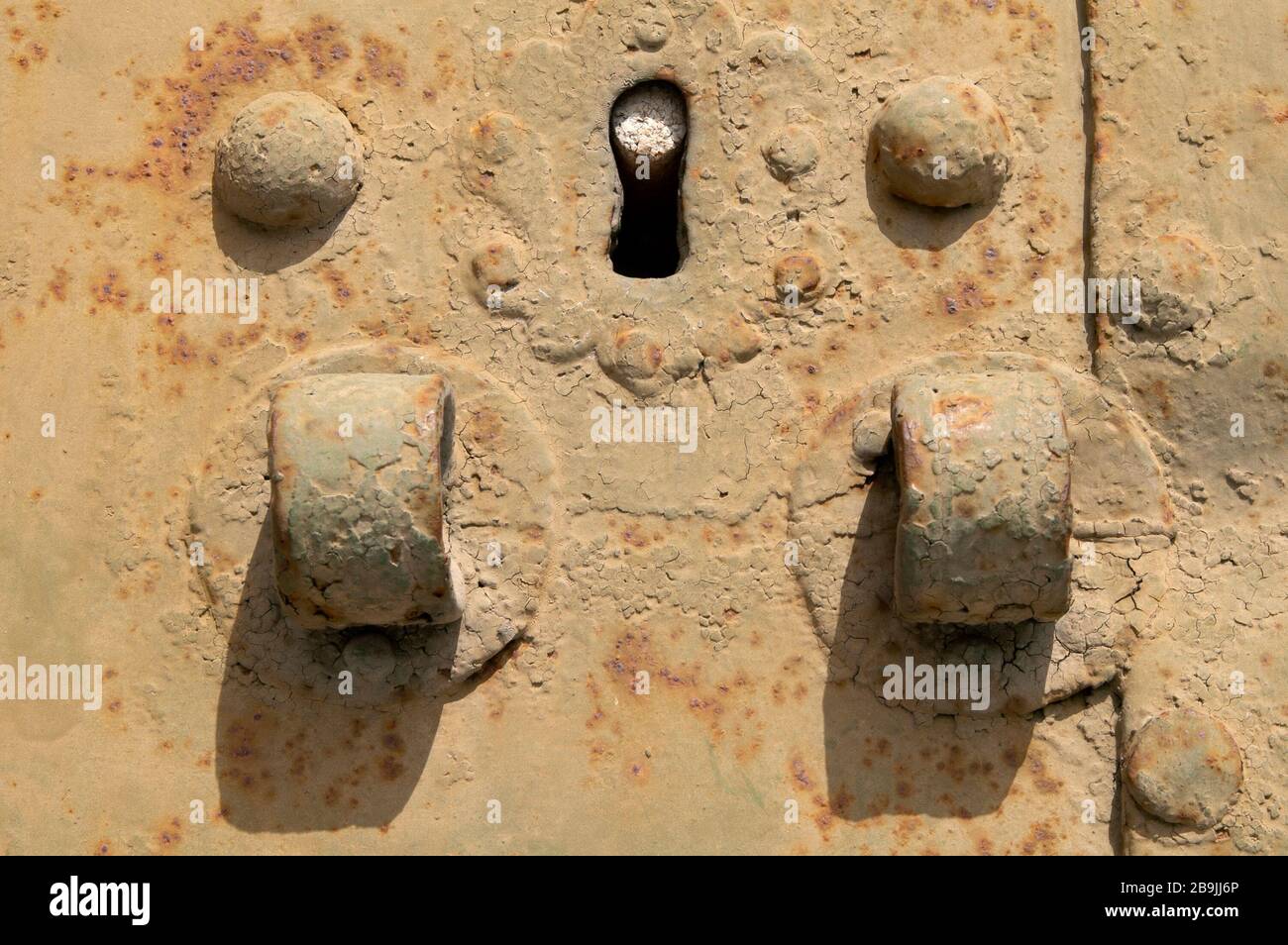 Old key hole and lock on weathered rusty metal door Stock Photo - Alamy