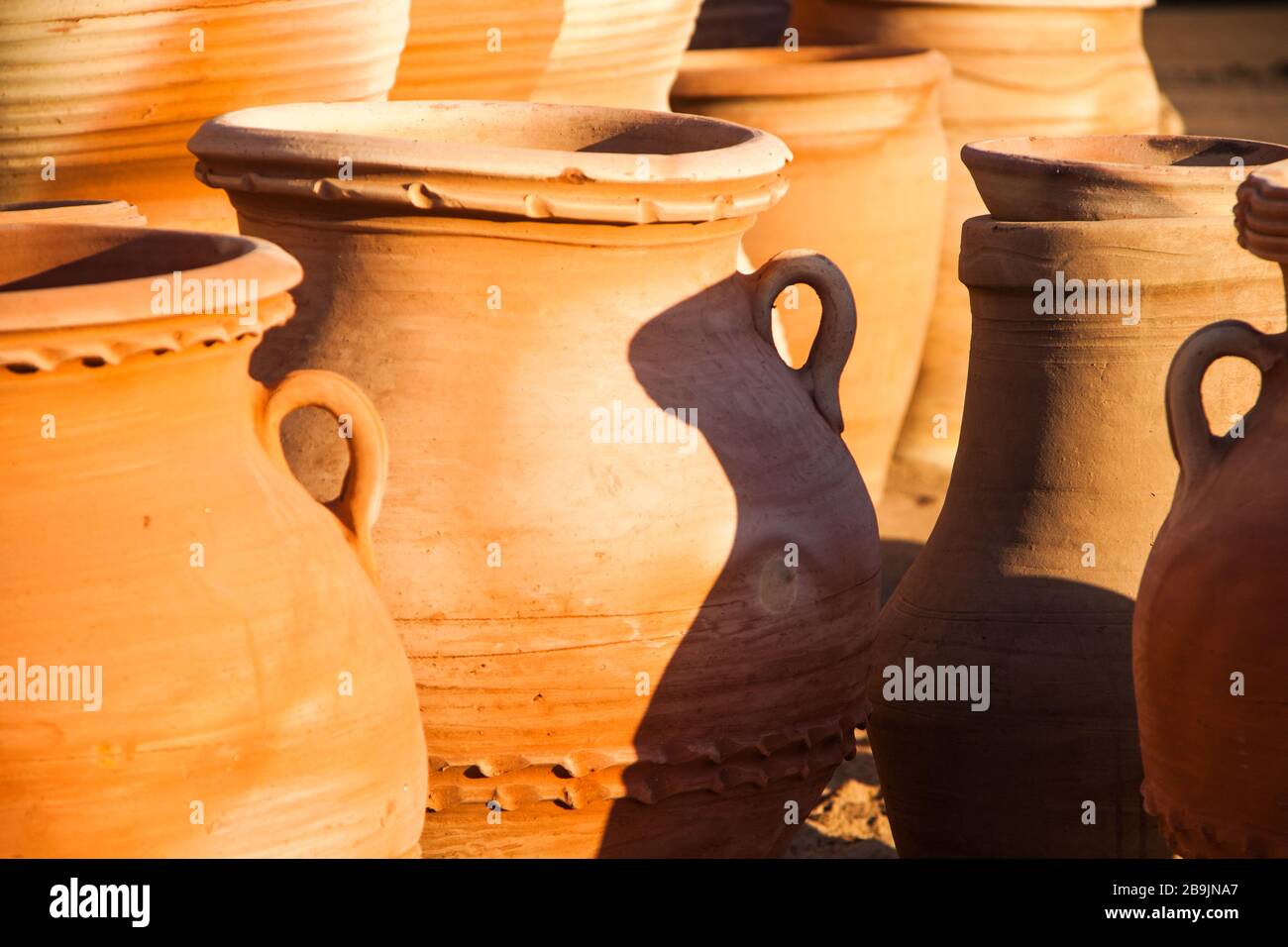 Unglazed Terracotta Clay Amphoras and Flower Pots (Earthenware Stock ...