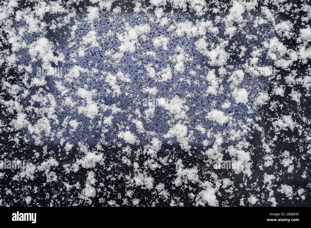 Snow on glass surface. Natural texture background Stock Photo - Alamy