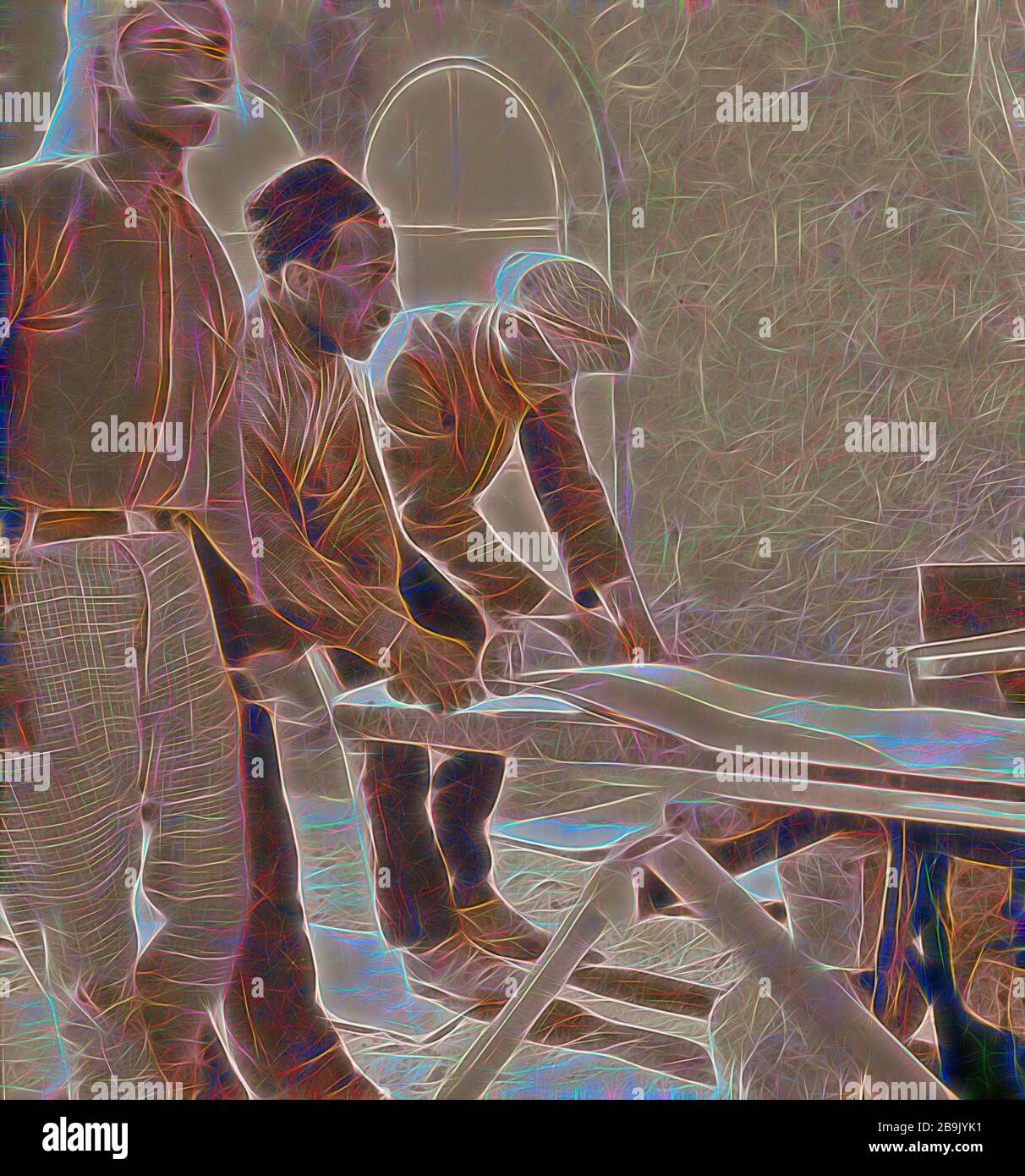 Making locust traps. 1925, Middle East Stock Photo - Alamy