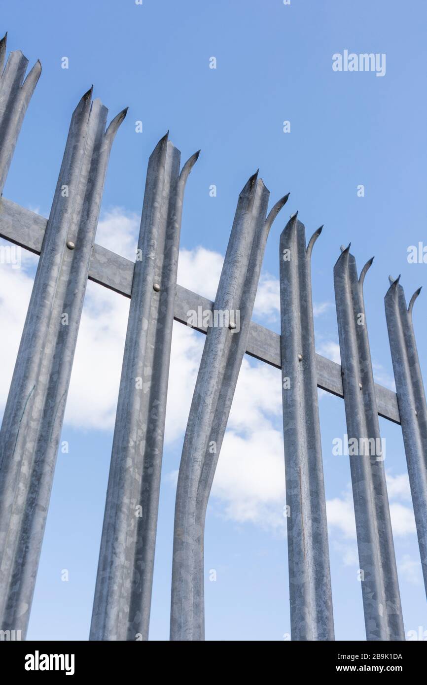 Bent segment of galvanised anti-climb steel fence. For 'Keep Out ...