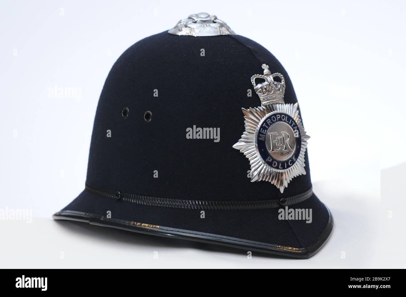 Real British Metropolitan Policeman hat / helmet on plain white ...