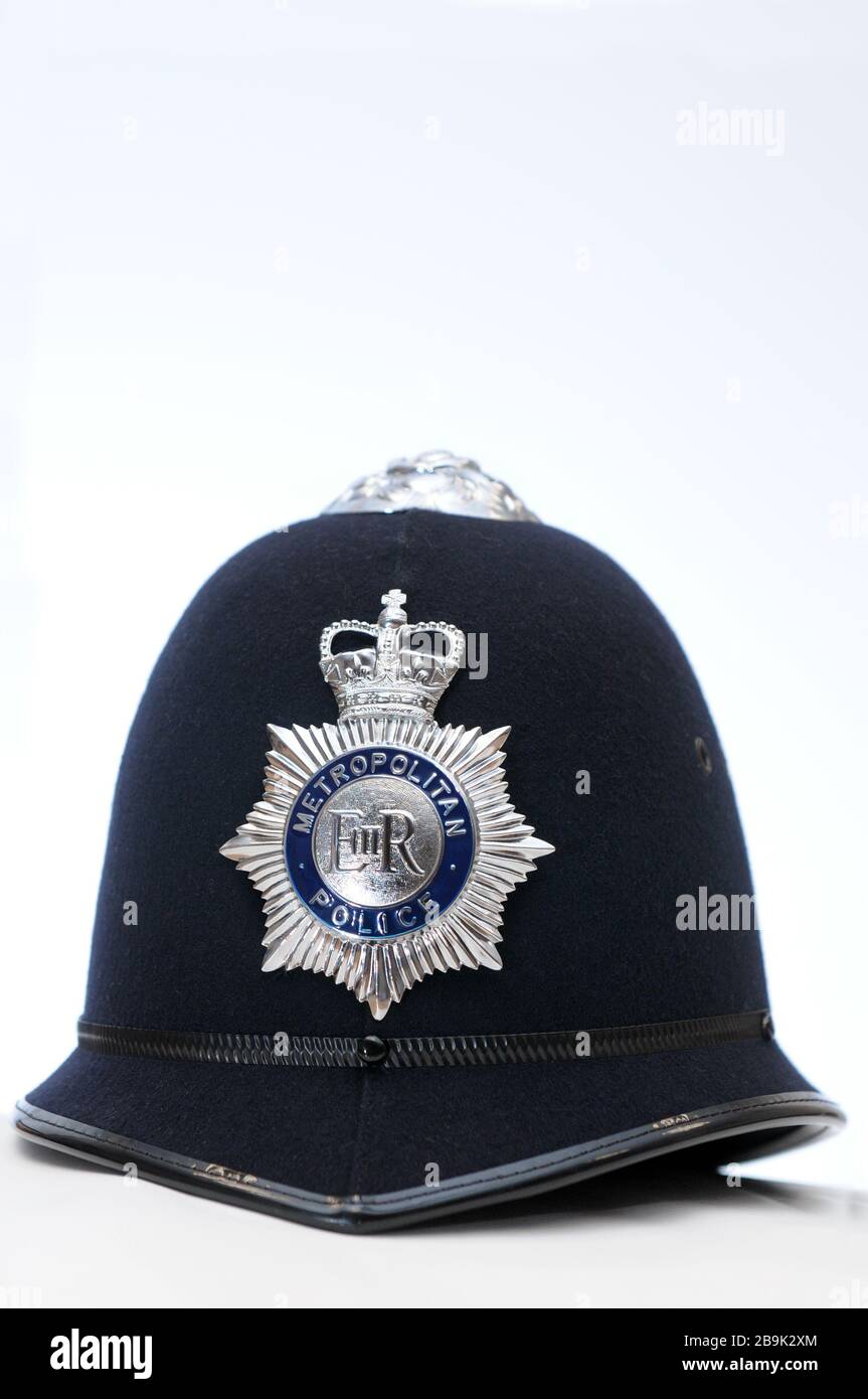 Real British Metropolitan Policeman hat / helmet on plain white ...